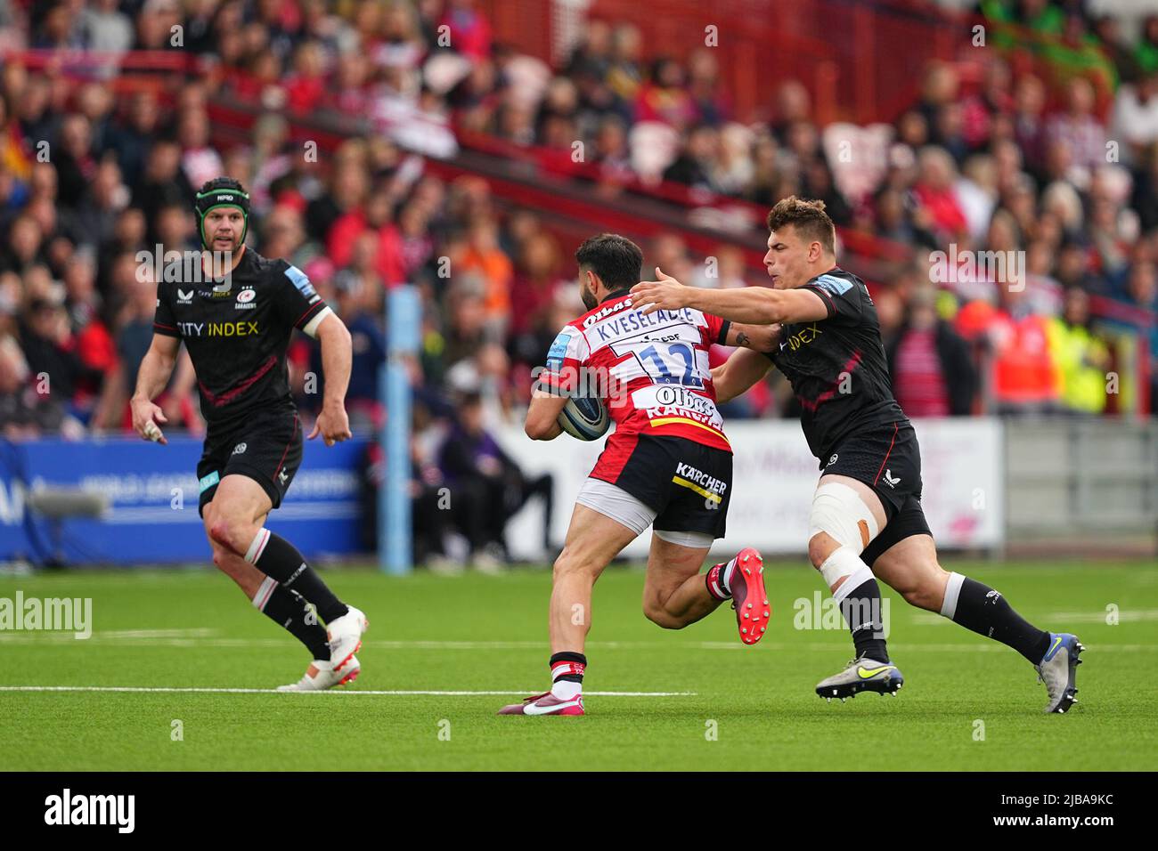 Theo Dan of Saracens brings down Giorgi Kveseladze of Gloucester Rugby ...