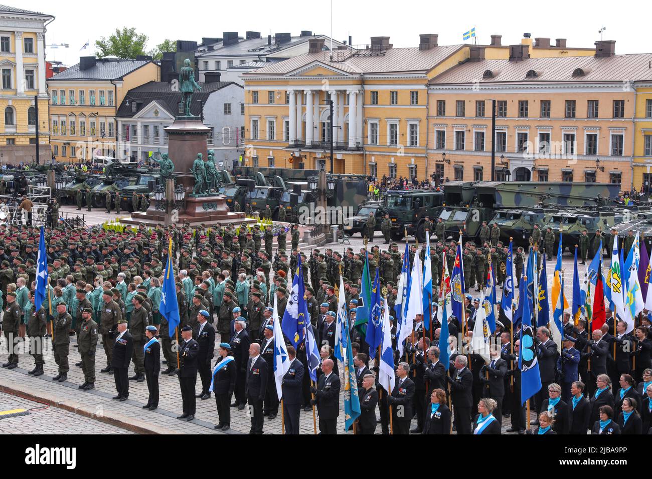 Representatives of various troops of the Finnish Armed Forces line up ...