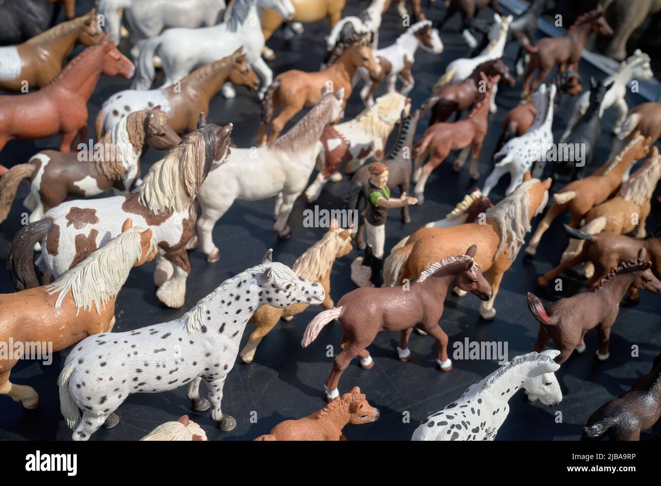 Plastic toys (horses) at the flea market in Hanover (No. 12 Stock Photo ...
