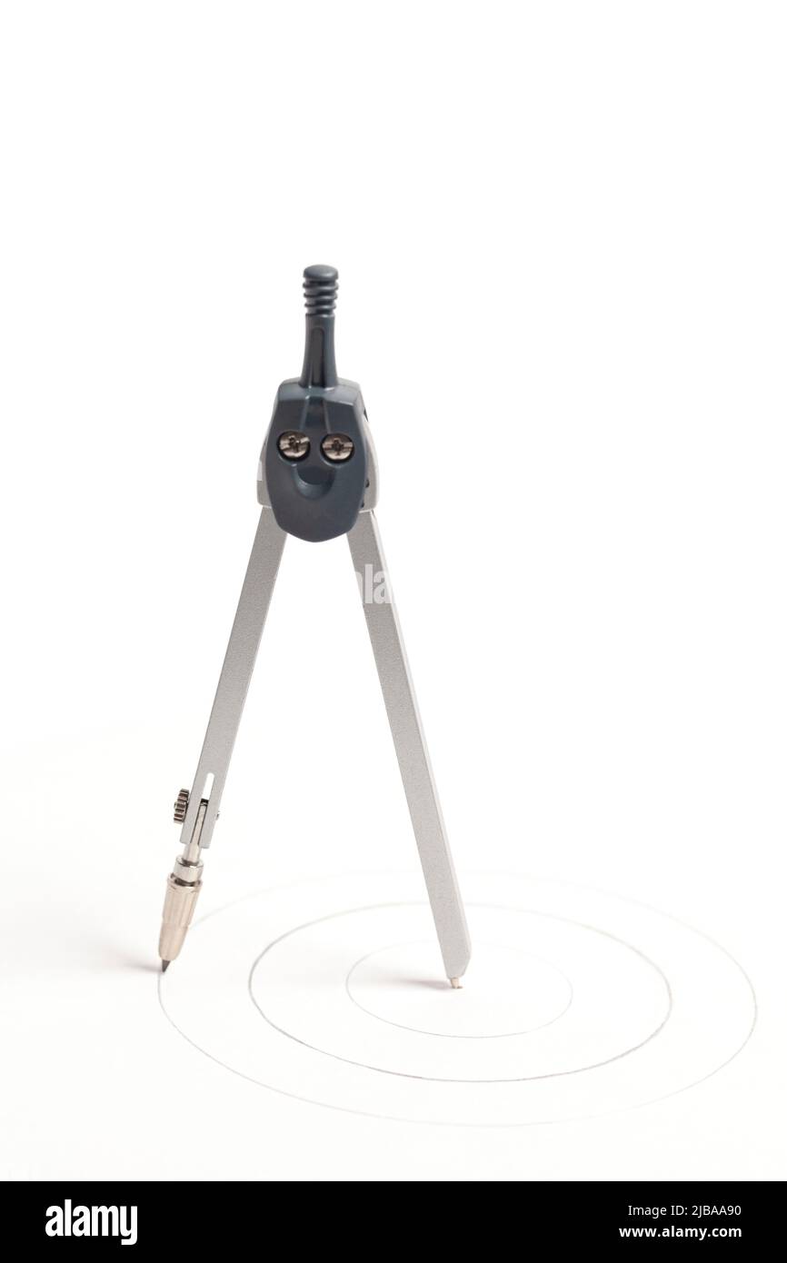 Metallic drawing compass isolated on white background Stock Photo - Alamy