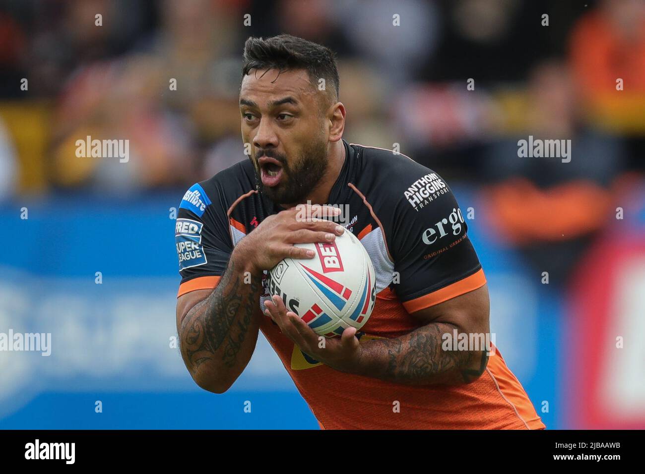 Kenny Edwards #11 of Castleford Tigers runs with the ball Stock Photo ...