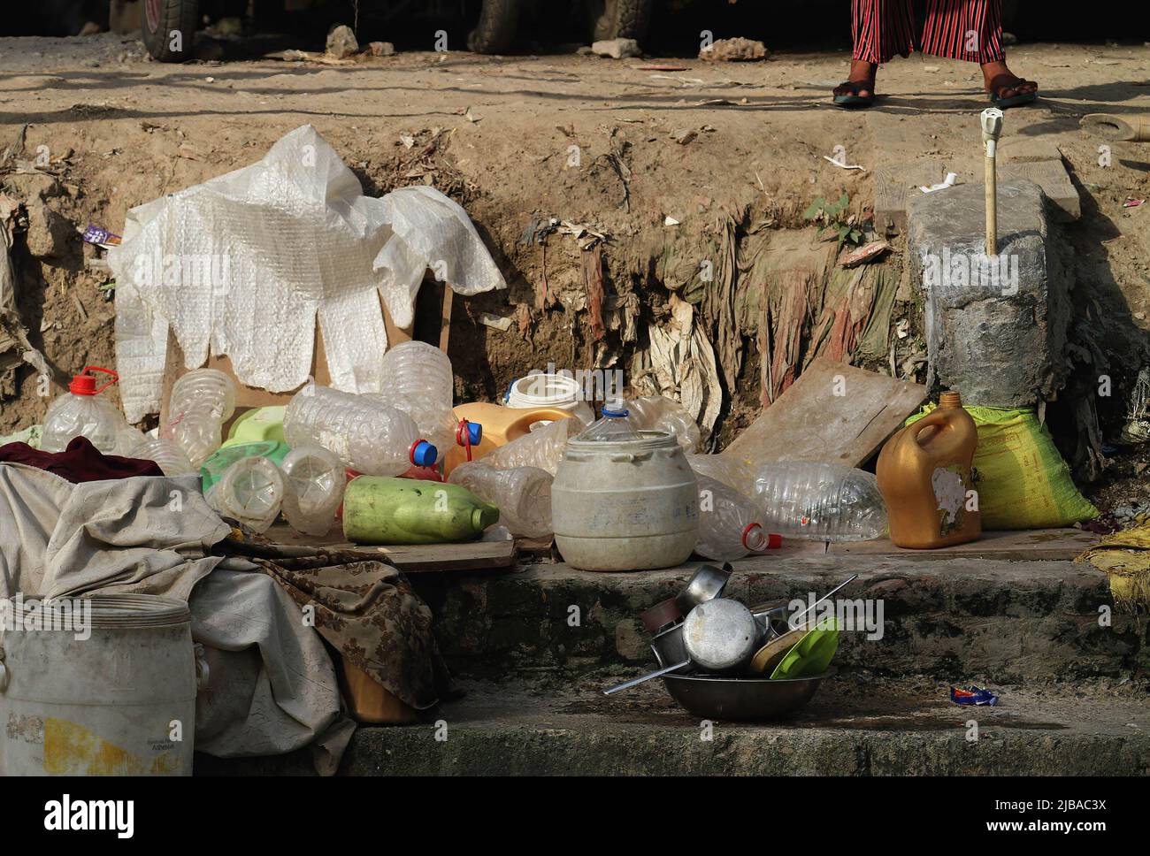 Empty plastic cans and utensils seen on the eve of the world ...