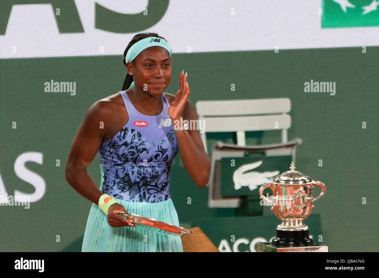 Coco Gauff of The United States reacts after being presented with the ...
