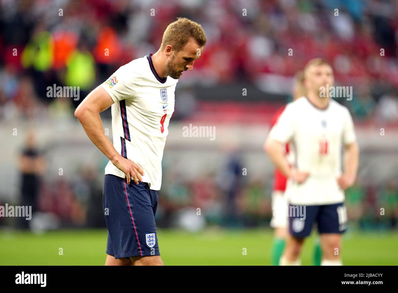 England's Harry Kane (left) and Jarrod Bowen look dejected after the ...