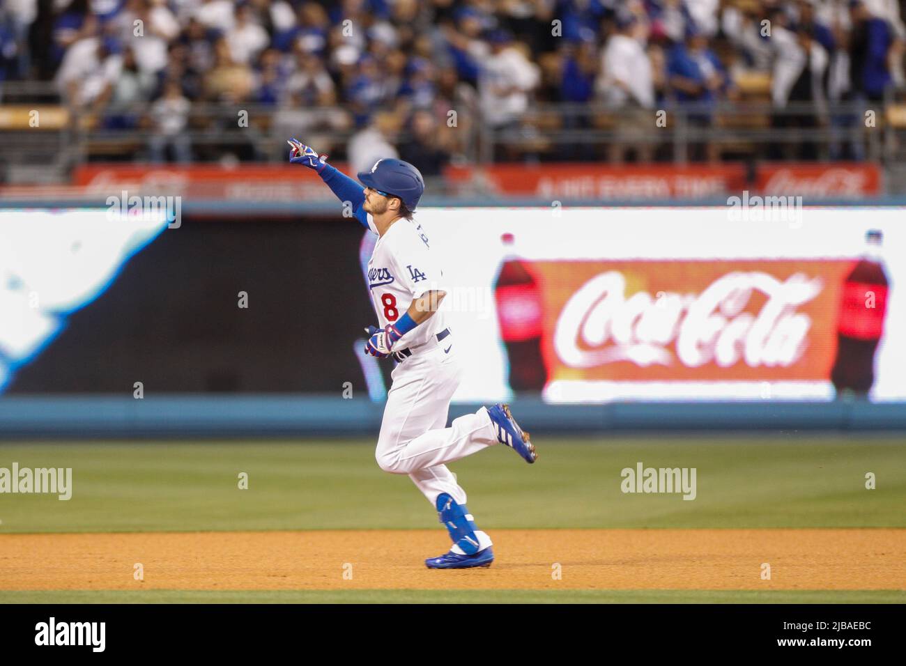 Los Angeles Dodgers designated hitter Zach McKinstry (8) hits a home ...