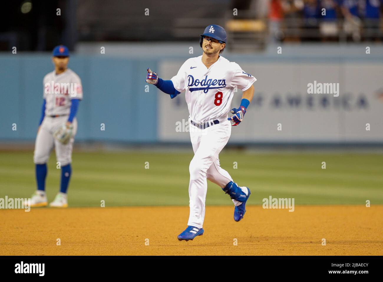 Los Angeles Dodgers designated hitter Zach McKinstry (8) hits a home ...