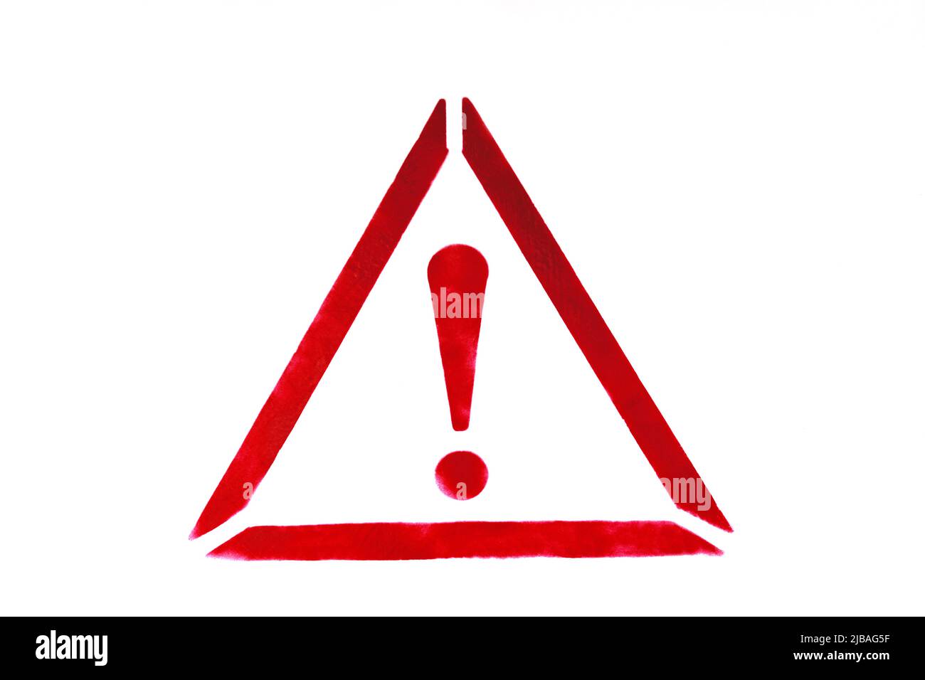 Exclamation mark in triangle drawn by red paint on white wall. Warning ... Exclamation mark in triangle drawn by red paint on white wall. Warning ...