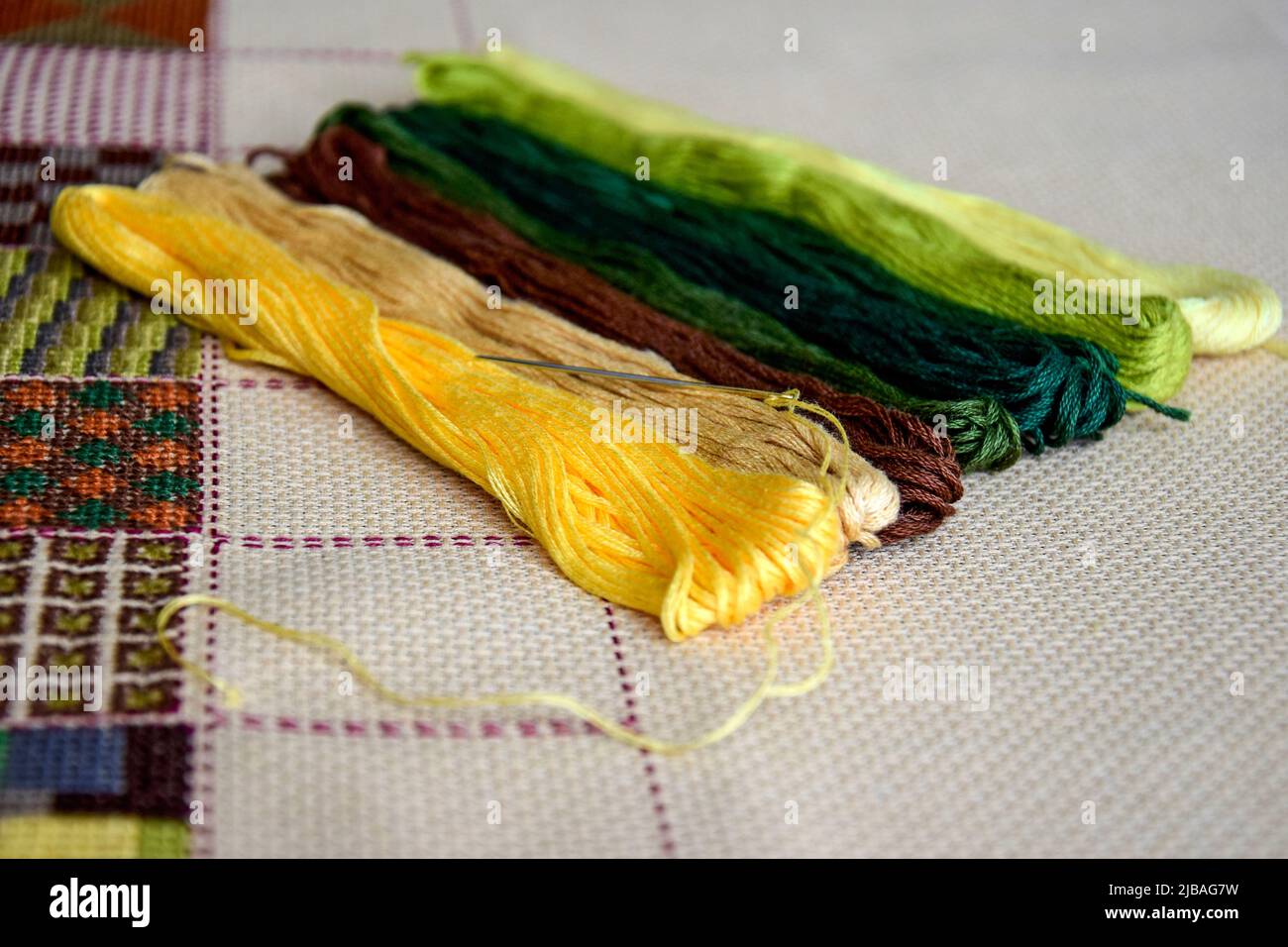 Cross stitch needle hi-res stock photography and images - Alamy