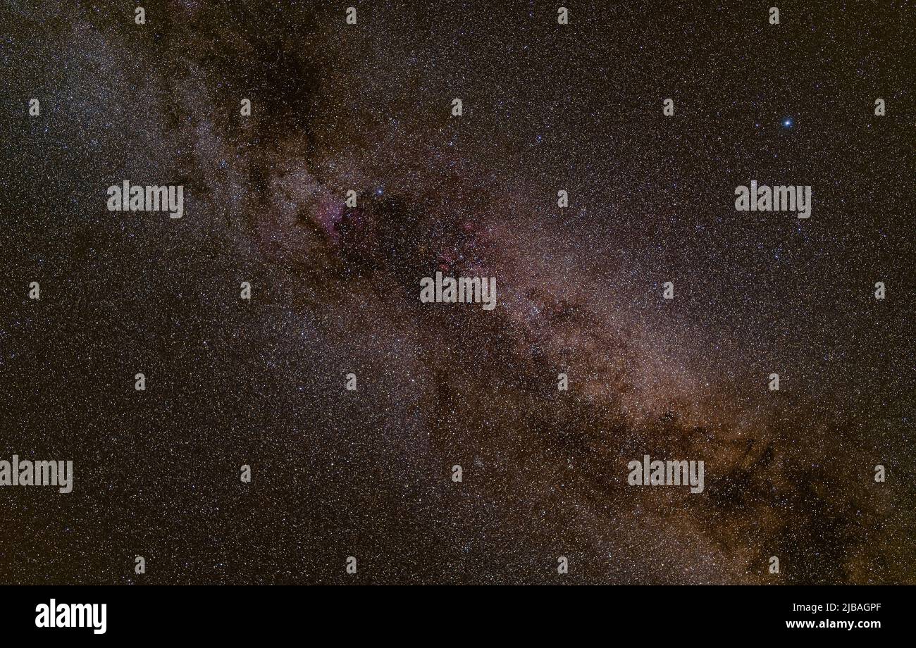 Night sky, many stars with milky way around Vulpecula and Cygnus ...