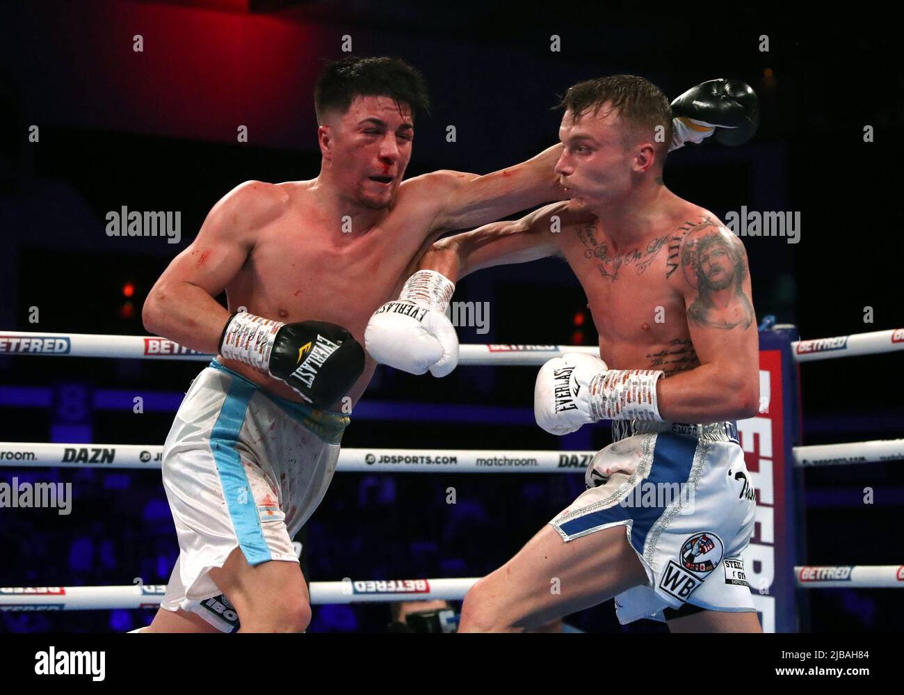 Mauro Perouene (left) and Dalton Smith in the World Boxing Council ...