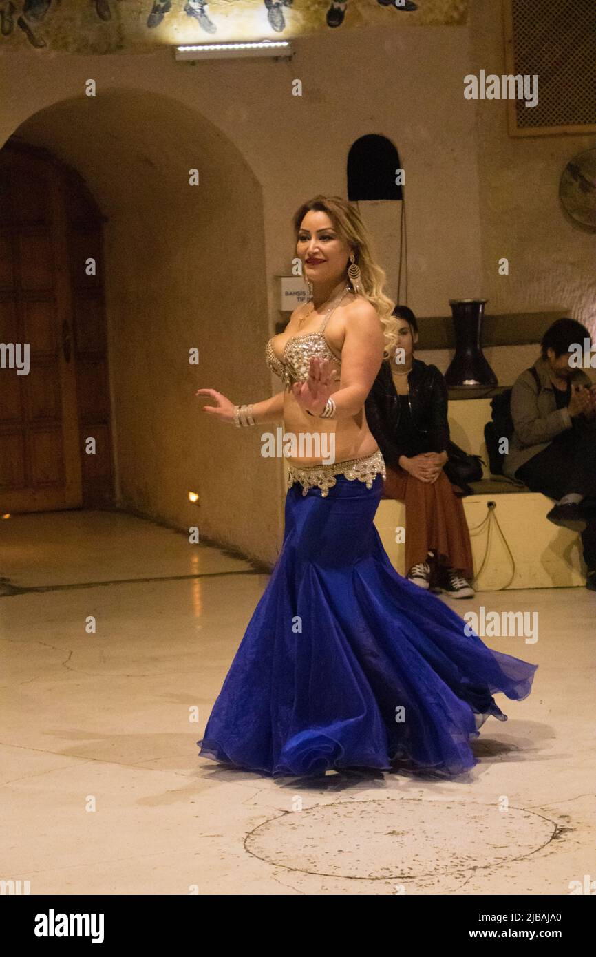 a turkish female dancer performing a küçek-belly dance for tourists in ...
