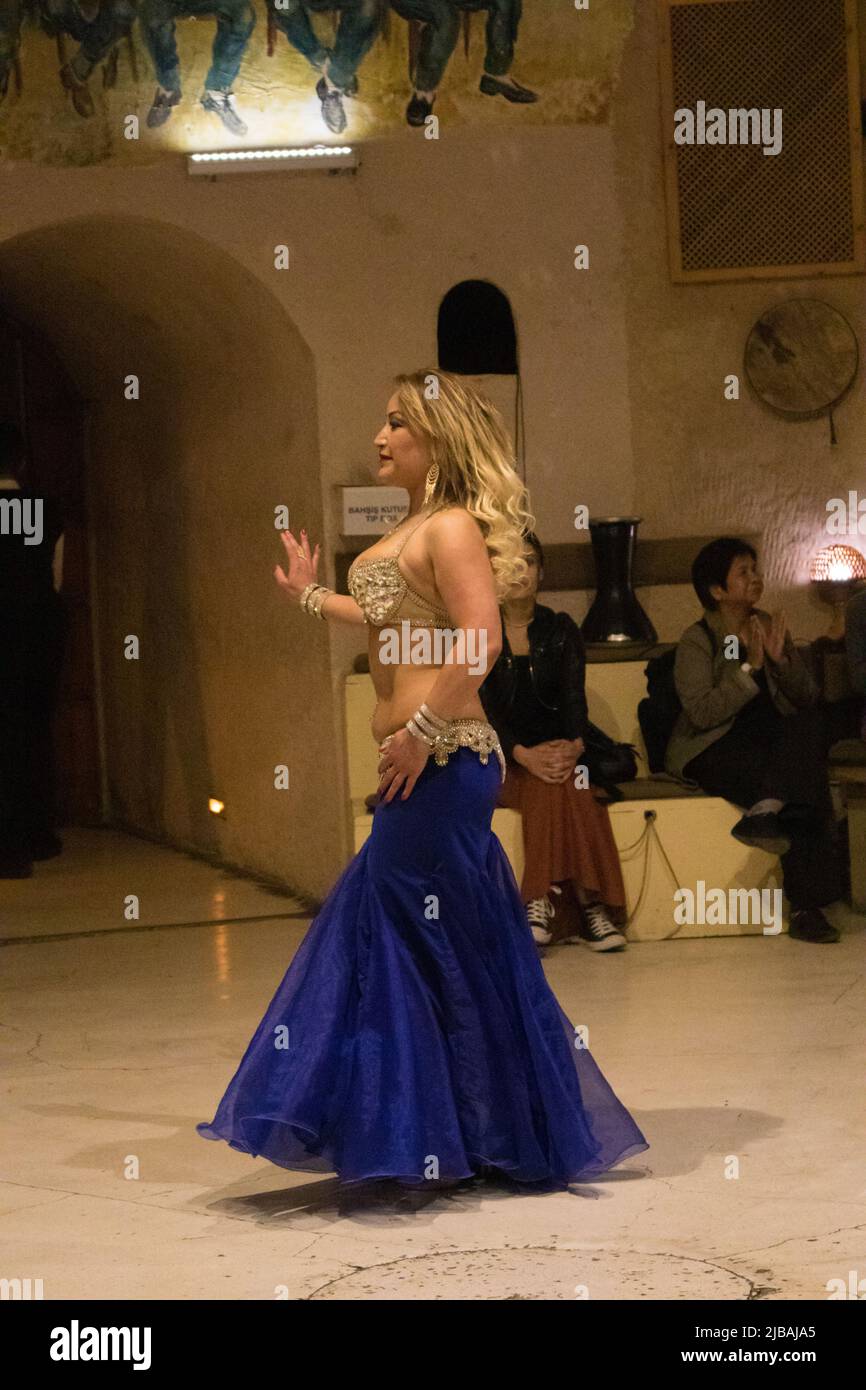 a turkish female dancer performing a küçek-belly dance for tourists in ...