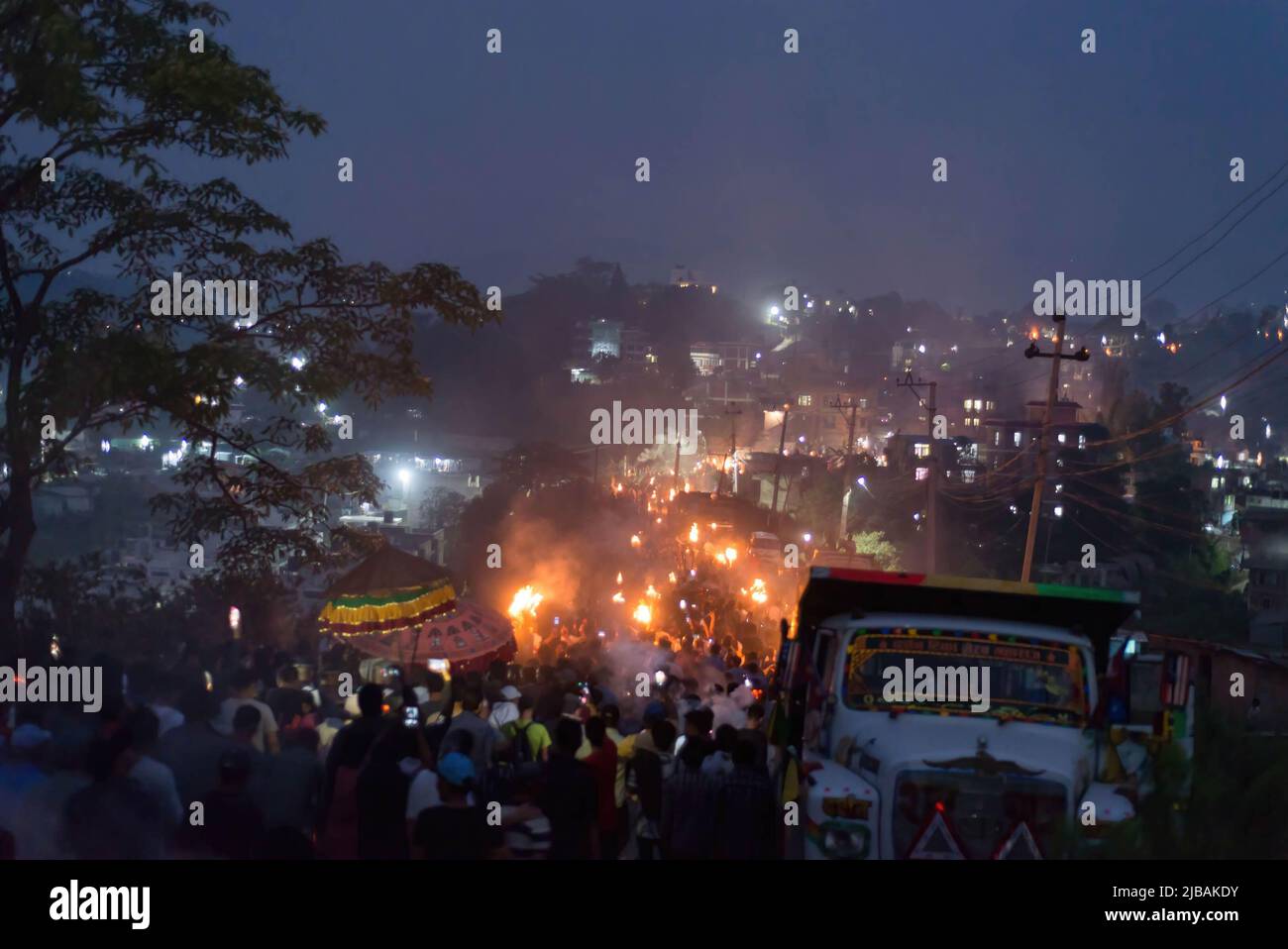 Devotees light traditional torches on the last day of the Rato ...