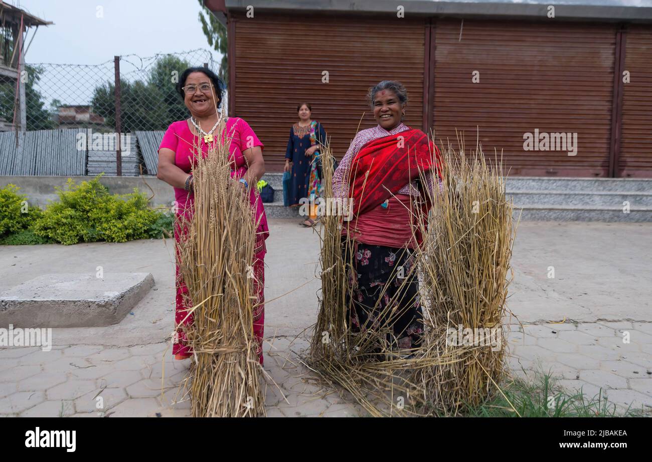 Devotees wait for the idol with the traditional torches during the ...