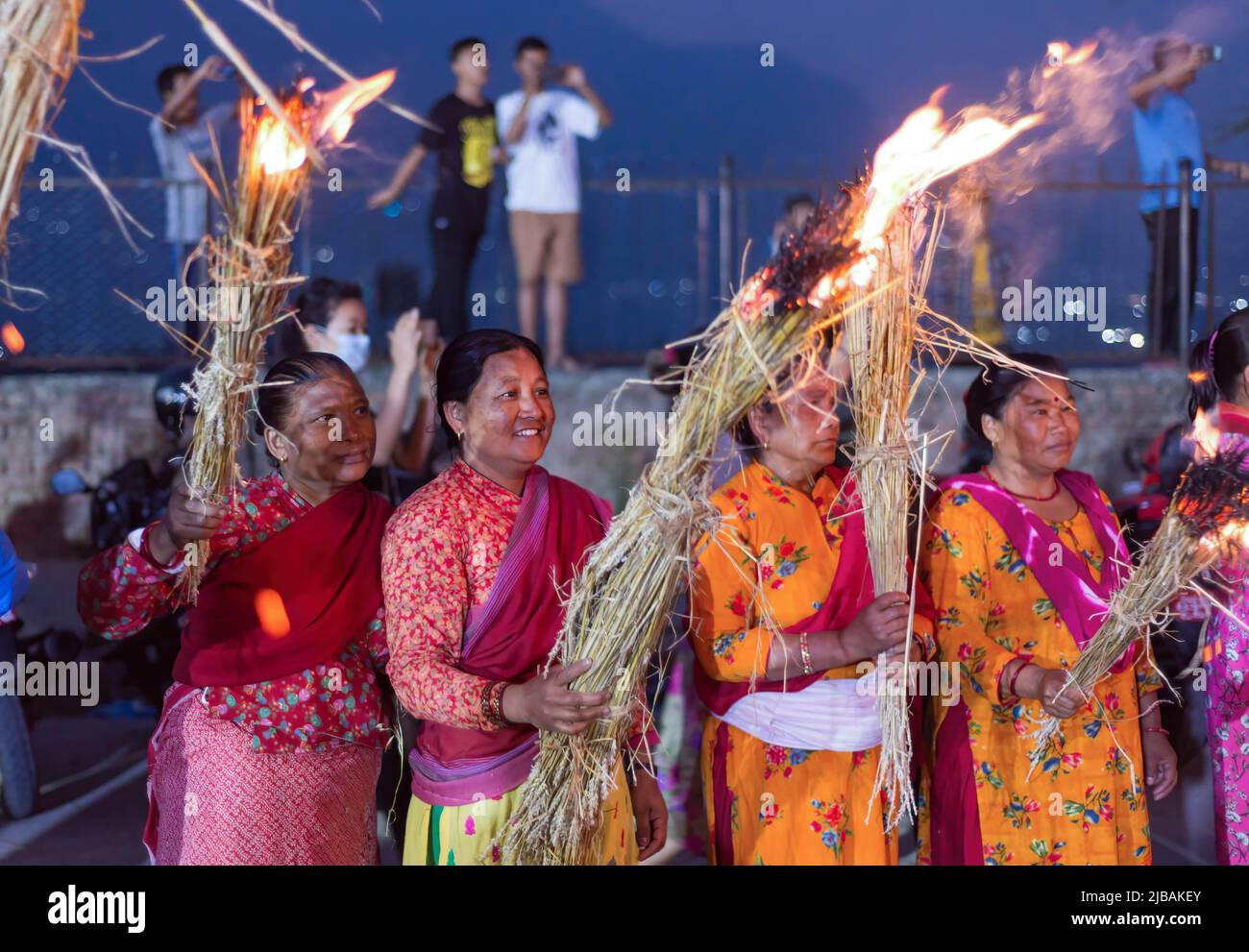 Devotees light traditional torches on the last day of the Rato ...