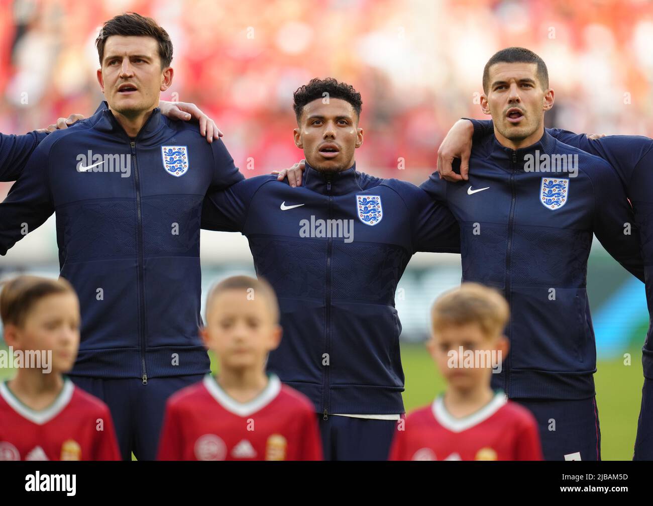 England's Harry Maguire, James Justin and Conor Coady sing the national ...