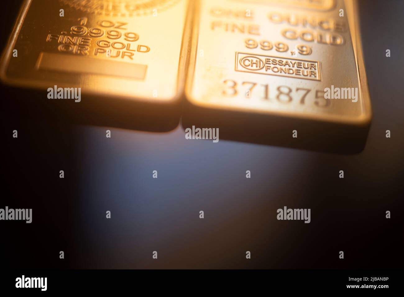 Solid pure 999.9 gold bullion ingot bars photo Stock Photo - Alamy