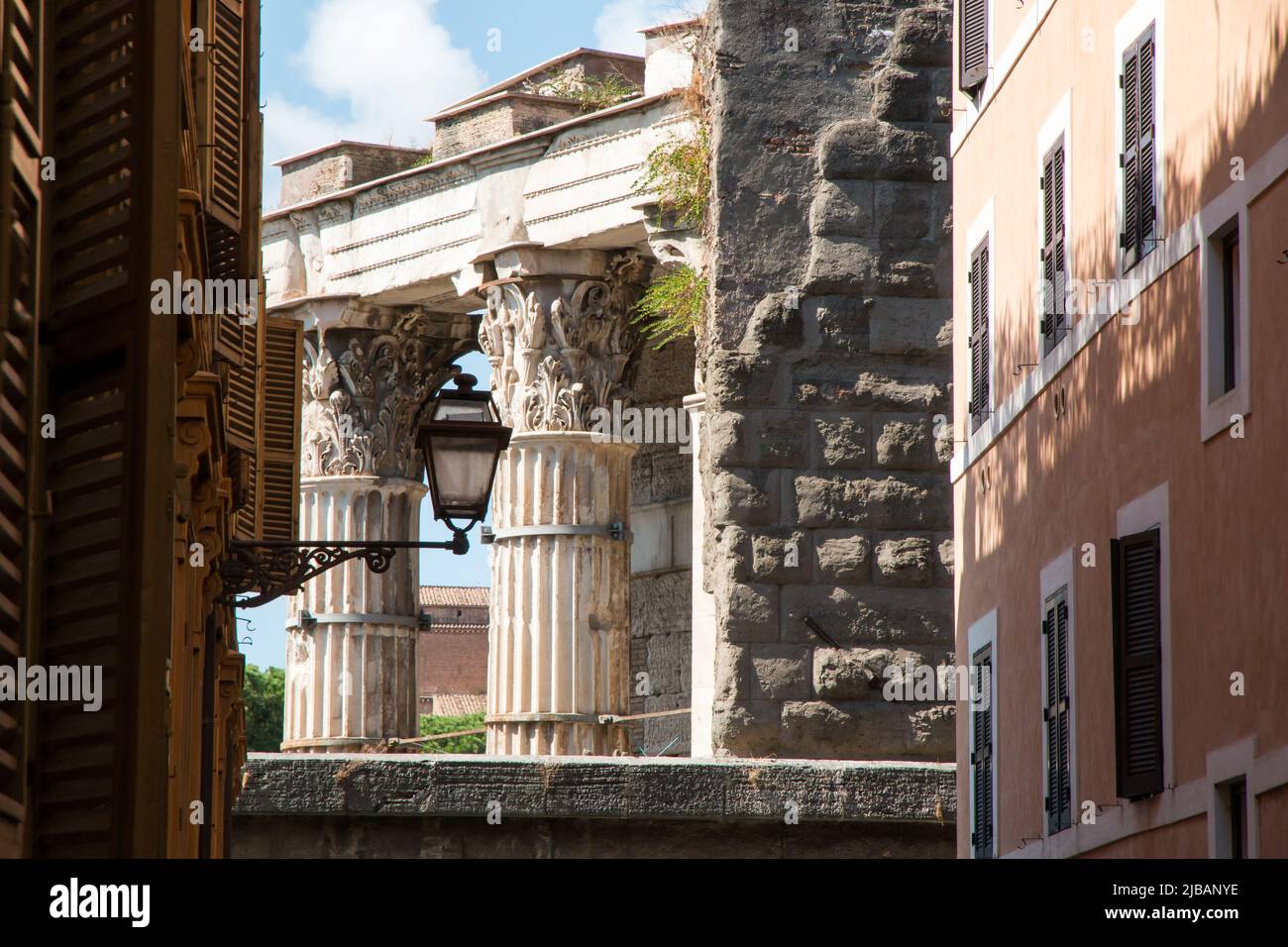View from an old Roman street with ancient columns from the old Roman ...