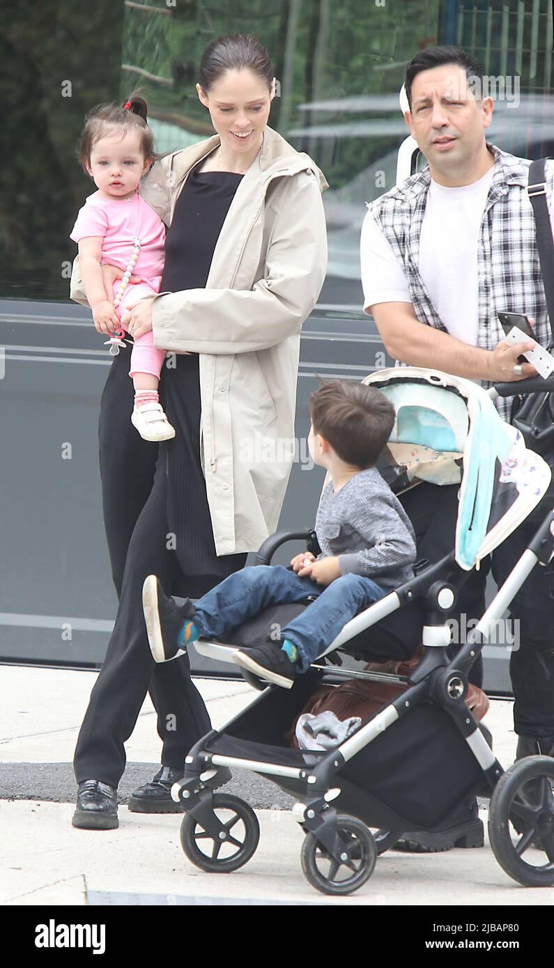 June 03, 2022.Coco Rocha, James Conran, and family walking in Soho in ...