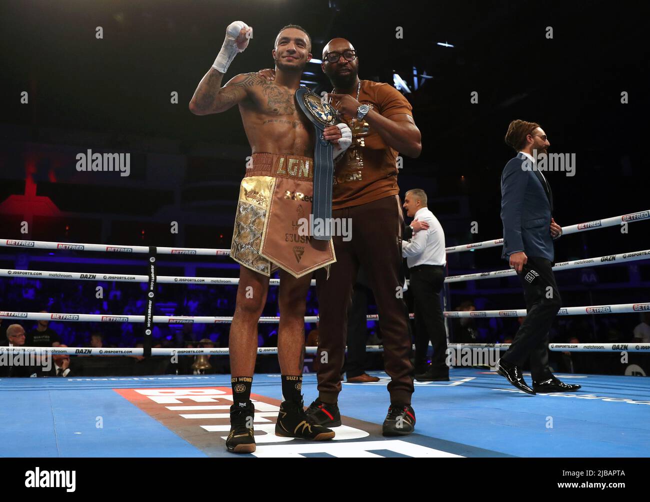 Zelfa Barrett (left) celebrates victory against Faroukh Kourbanov in ...