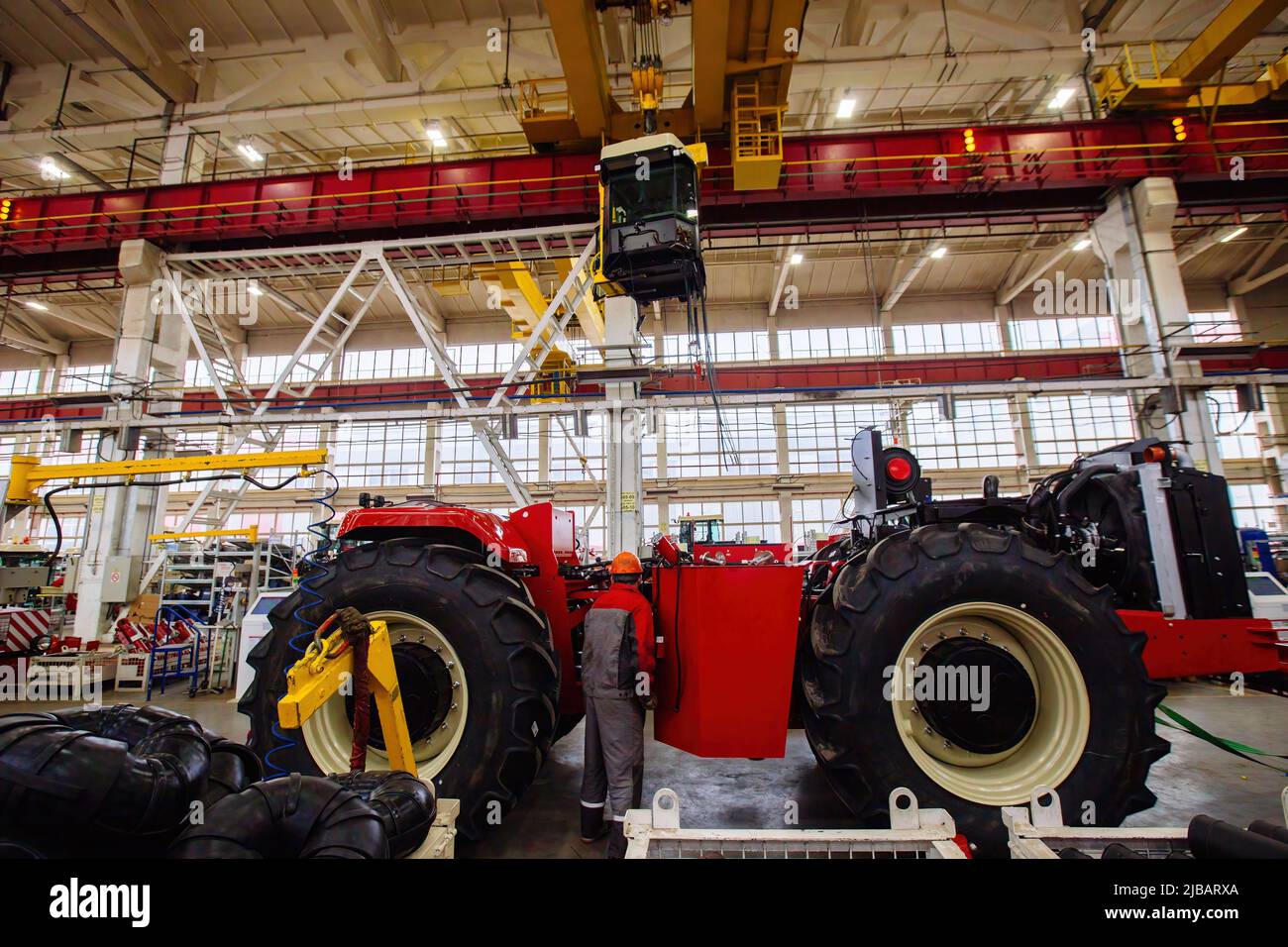 Assembly process of agricultural tractors in industrial workshop Stock ...