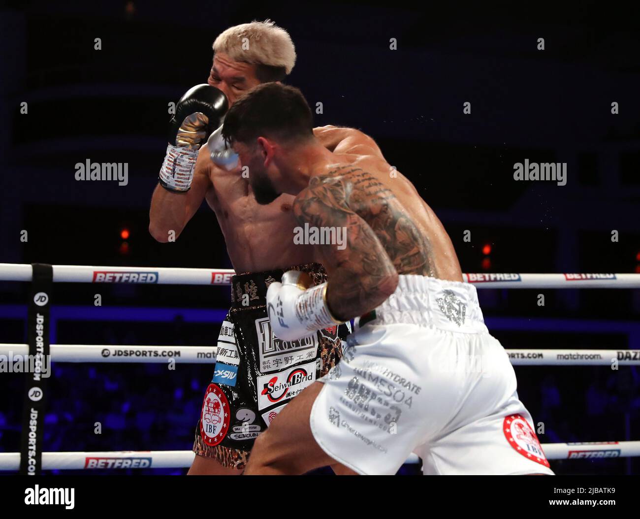 Joe Cordina (right) lands the knockout blow on Kenichi Ogawa in the ...