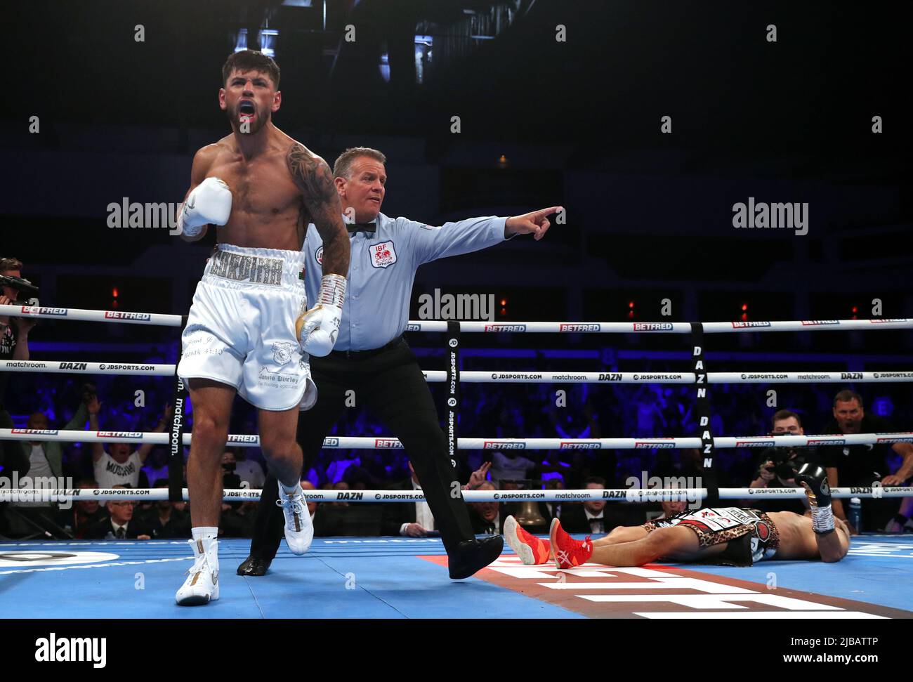 Joe Cordina (left) reacts after landing the knock-out blow on Kenichi ...