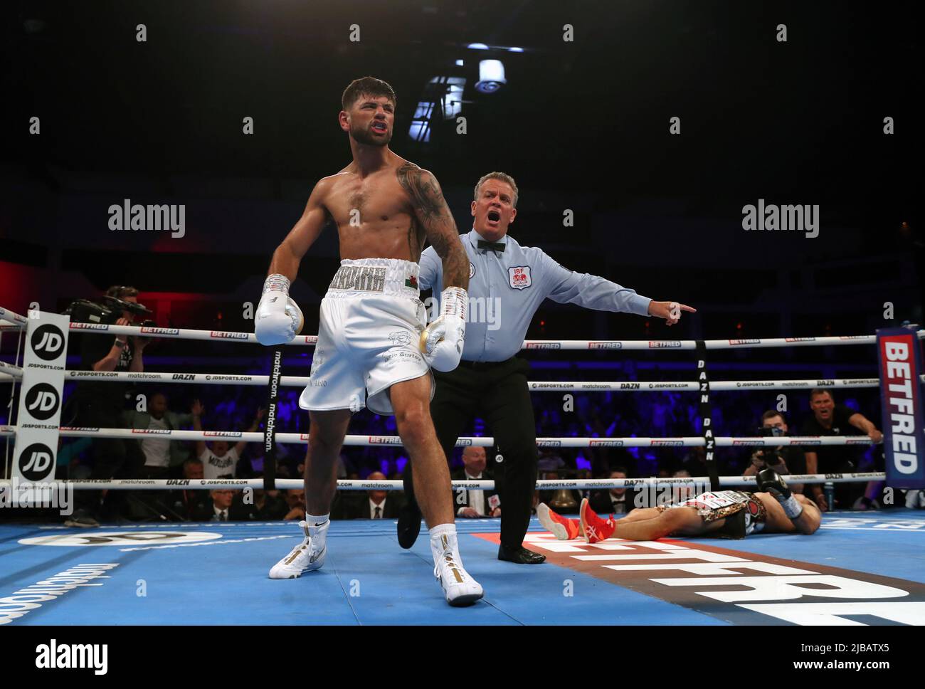 Joe Cordina (left) reacts after landing the knock-out blow on Kenichi ...