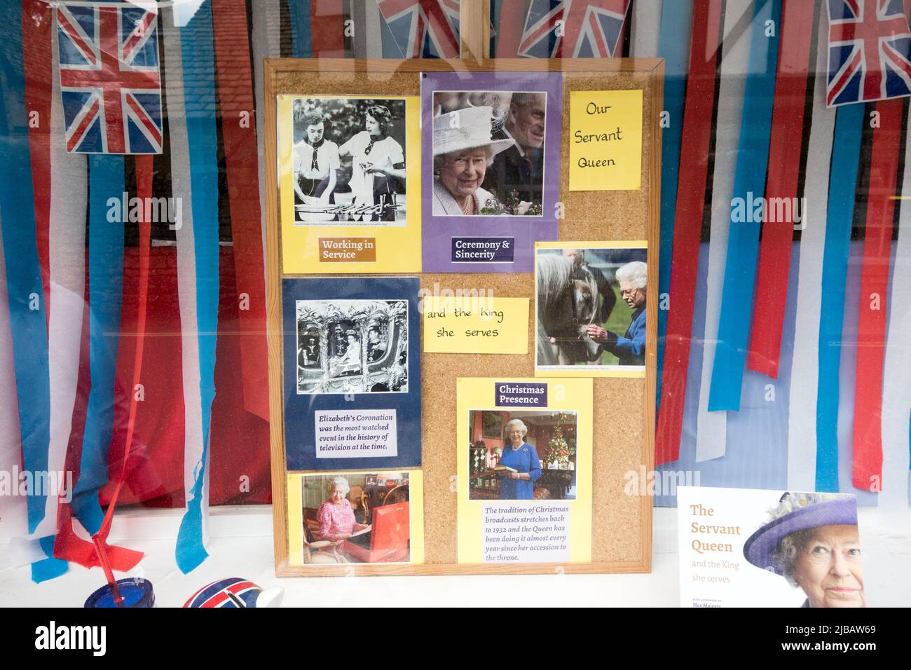 Queen Elizabeth achievements display in a shop in Bourton on Water ...