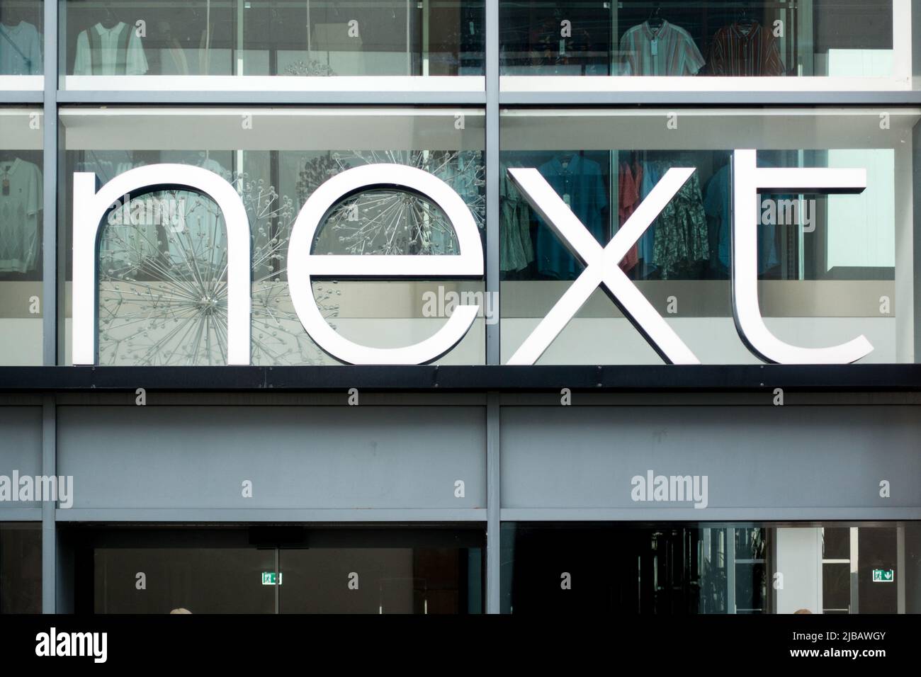 NEXT store sign board Stock Photo - Alamy