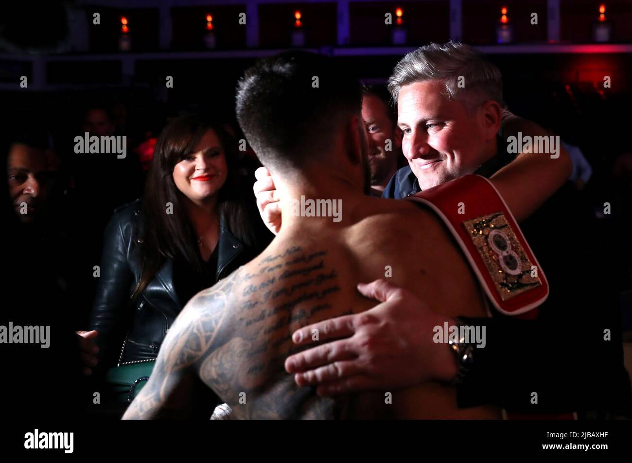 Joe Cordina celebrates with his family after defeating Kenichi Ogawa in ...