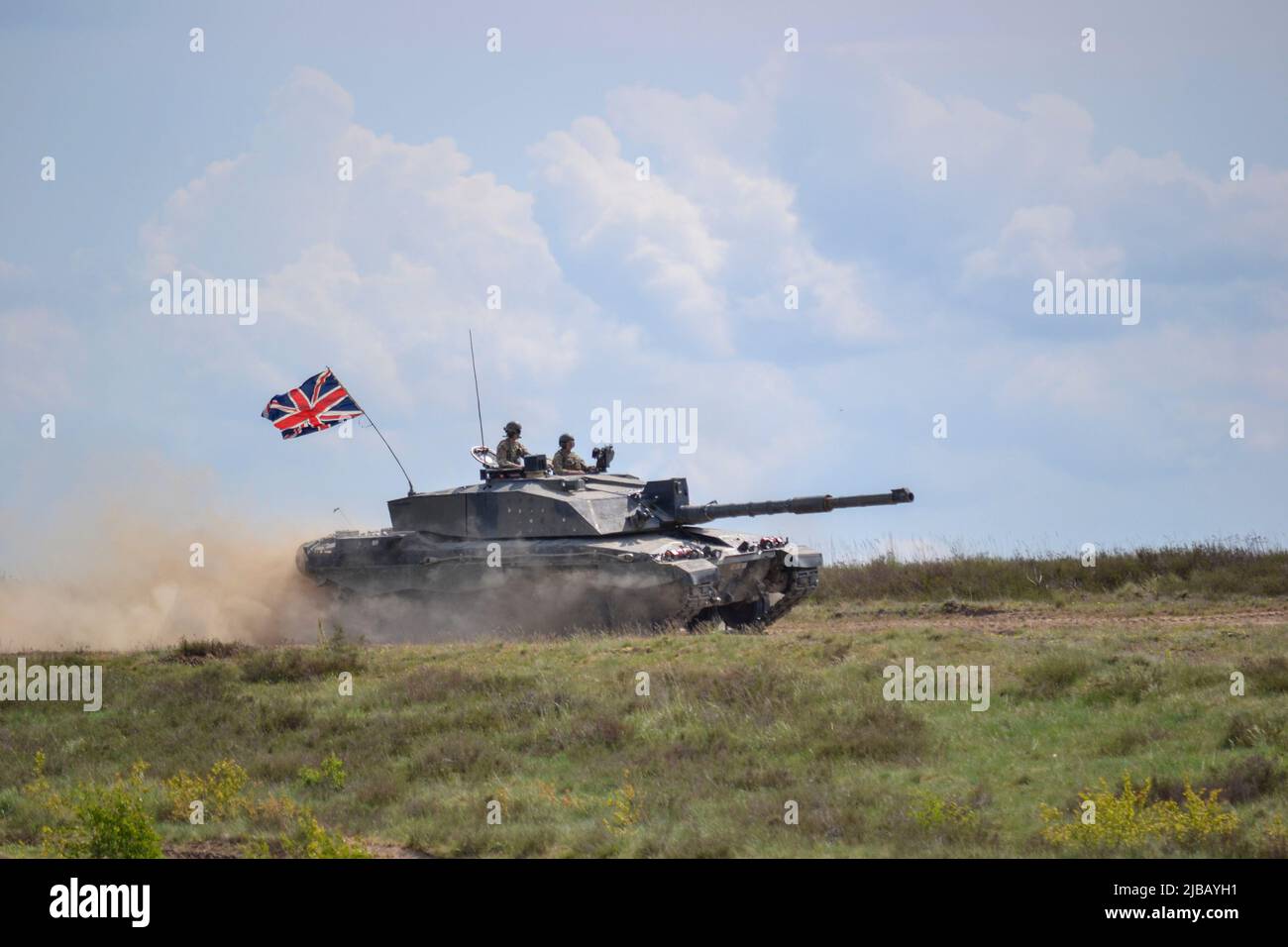 A British army Challenger 2 tank moves to a staging area following a ...