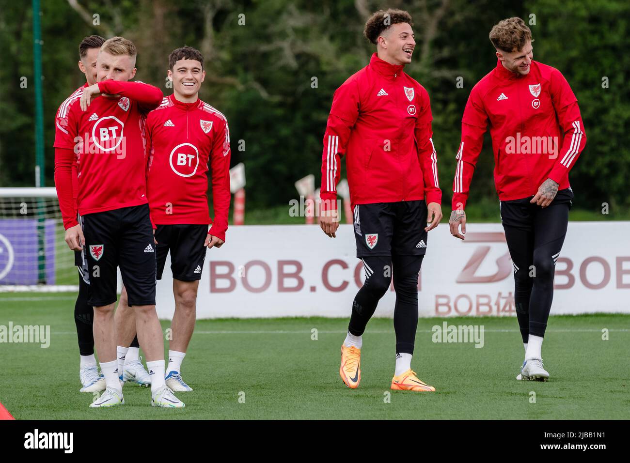 PONTYCLUN, WALES - 04 JUNE 2022: Wales' Joe Morrell, Wales' Dan James ...