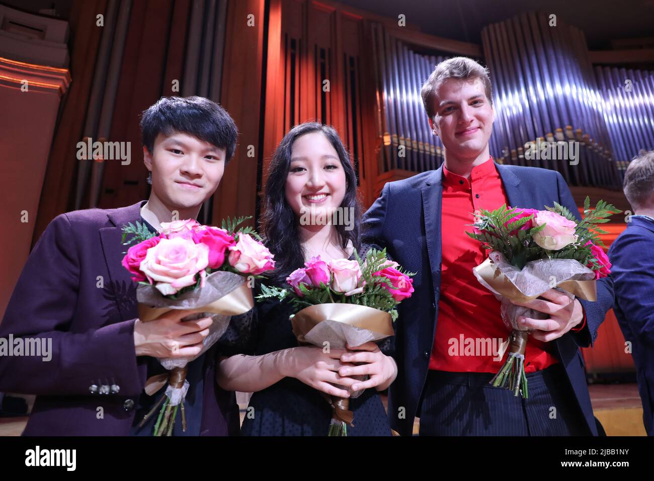 Second place Yibai Chen, winner Hayoung Choi and third place Marcel ...