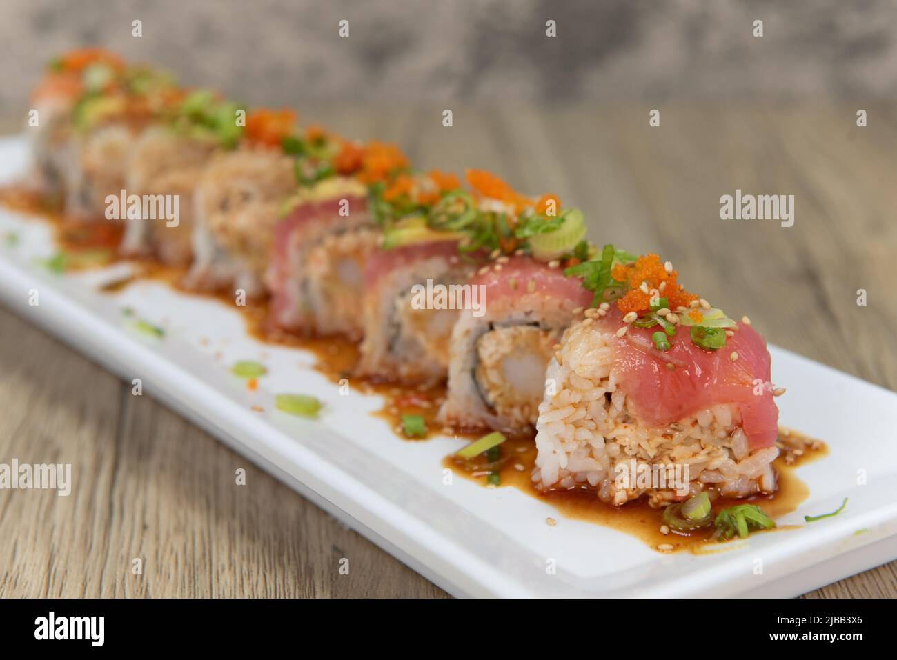 Asian cuisine sushi roll with krab meat mixed with shrimp tempura and ...