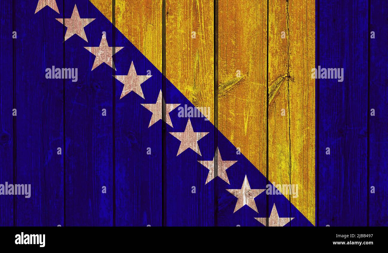 Top view of Old Painted Flag of Bosnia and Herzegovina on Dark Wooden ...