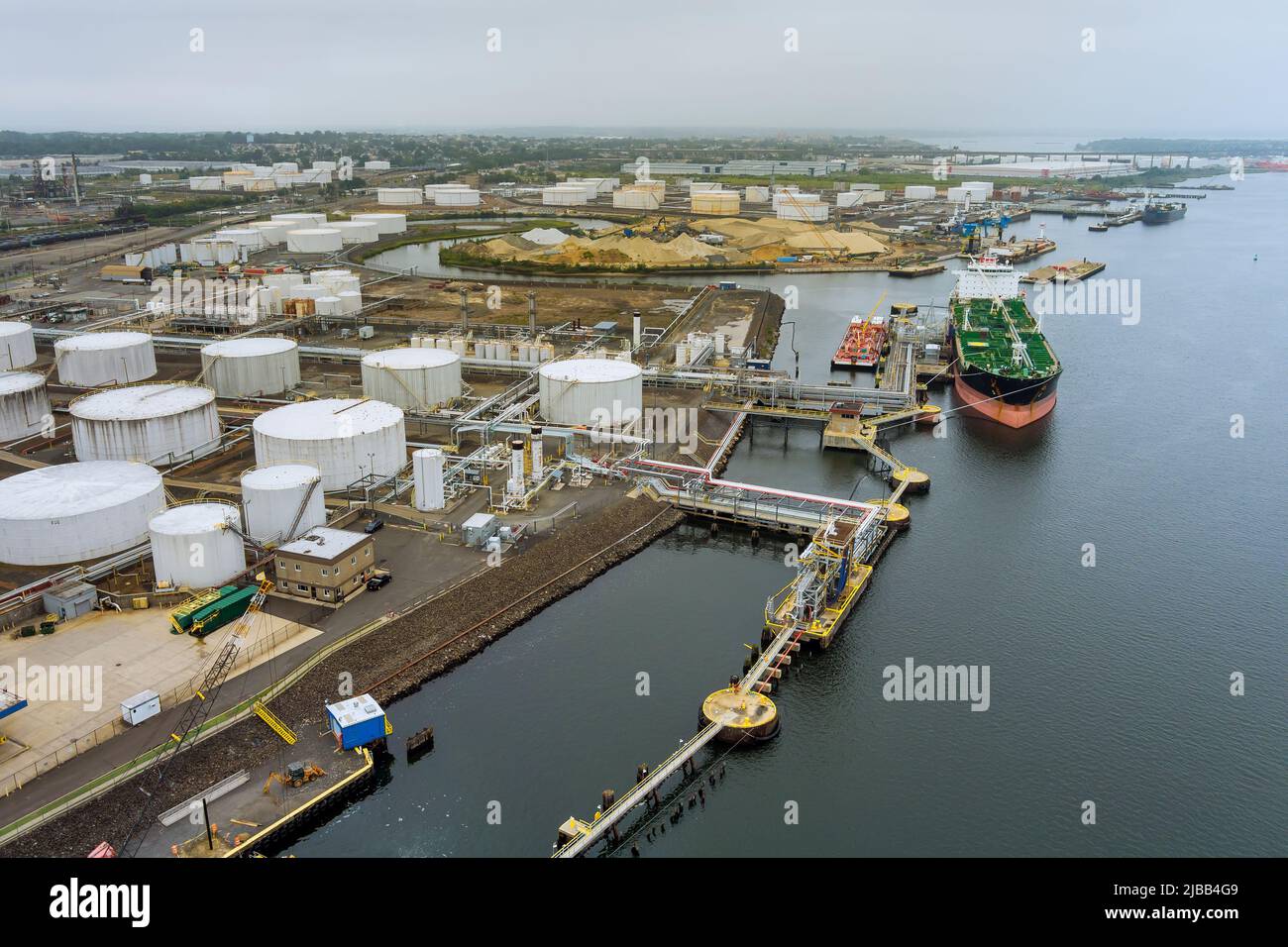 Cargo oil tanker is transferring oil to the crude oil storage Stock ...