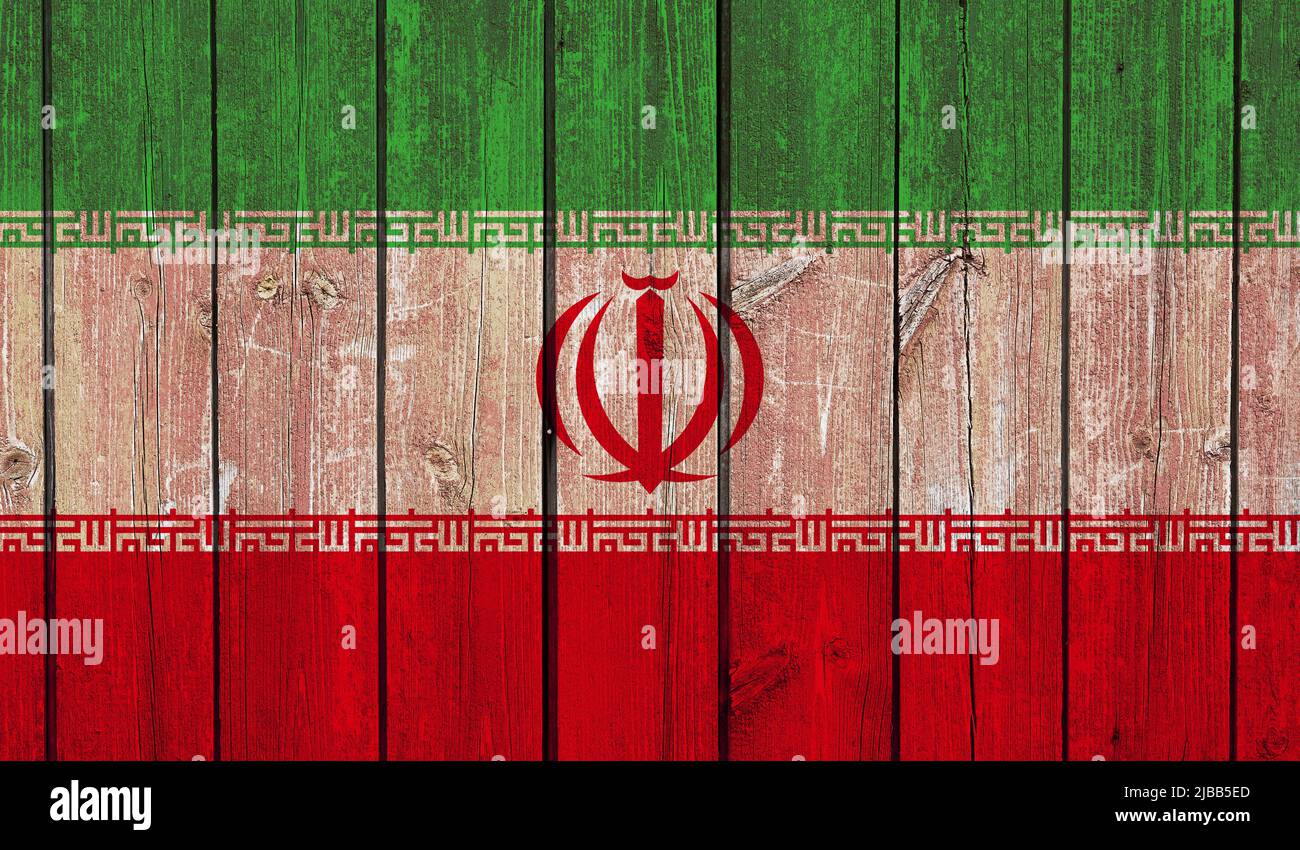 Top view of Old Painted Flag of Iran on Dark Wooden Fence, wall ...