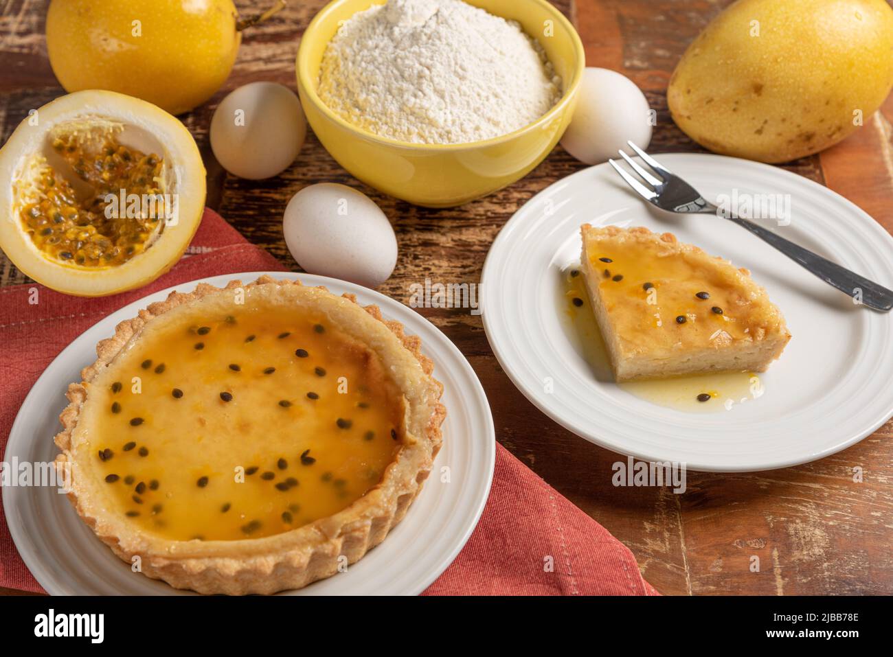 Homemade passion fruit pie with and a golden crust, on wooden ...