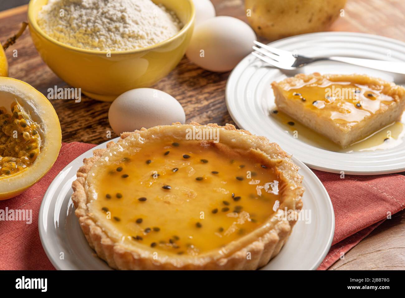 Homemade passion fruit pie with and a golden crust, on wooden ...