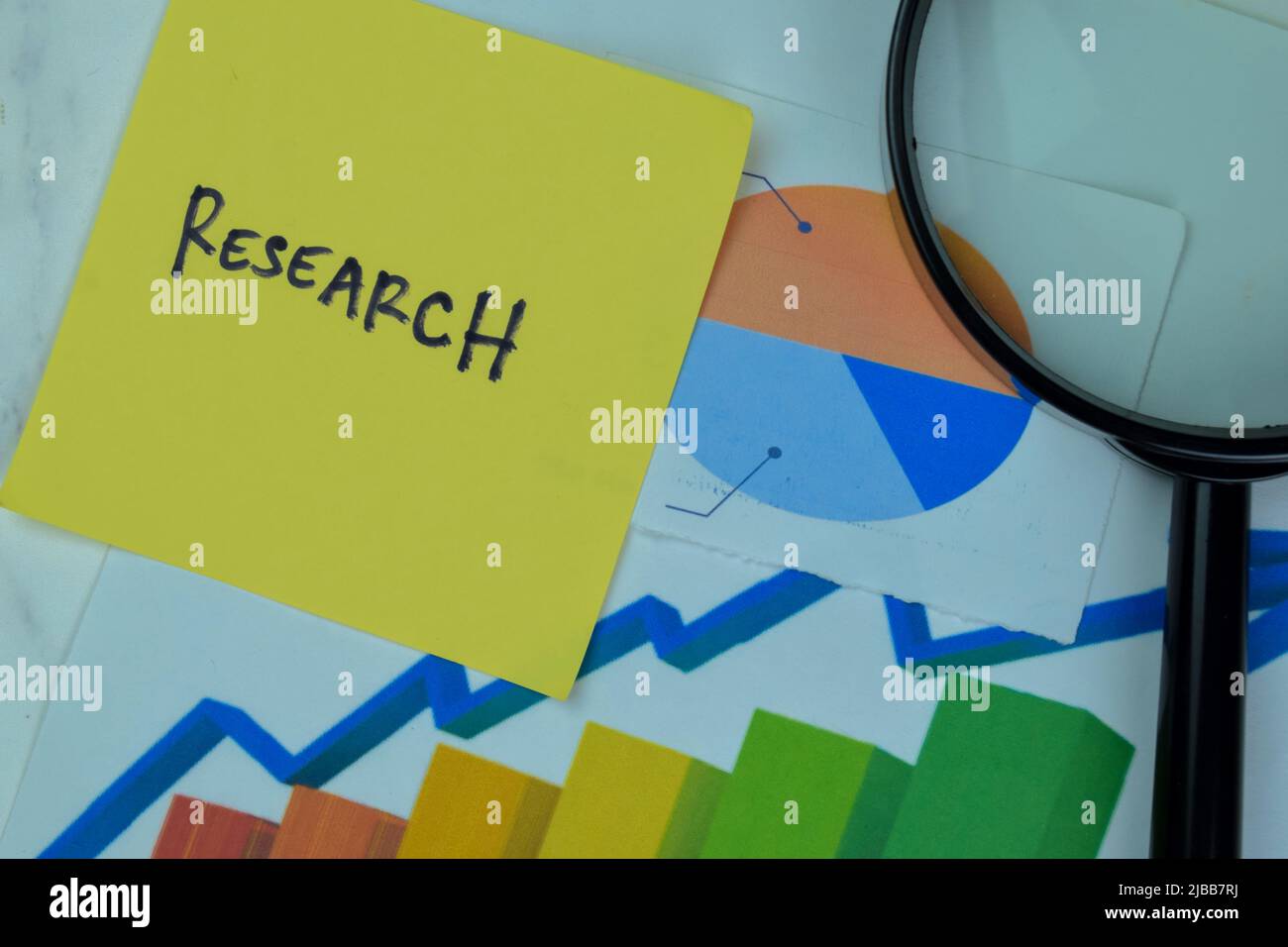 Concept of Research write on sticky notes with diagram or graph ...