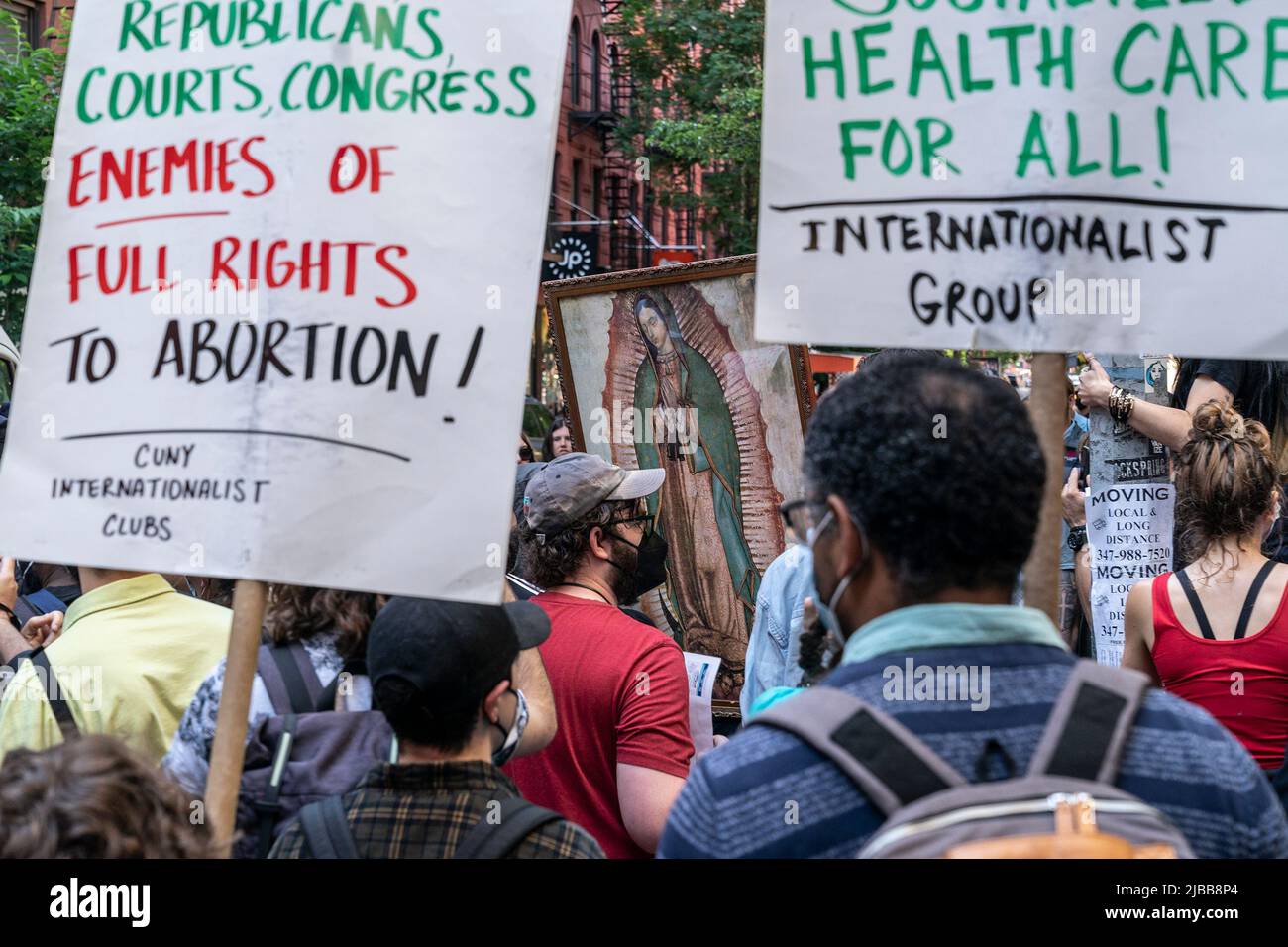 Pro-choice and pro-life supporters confronted each other on Mott street ...