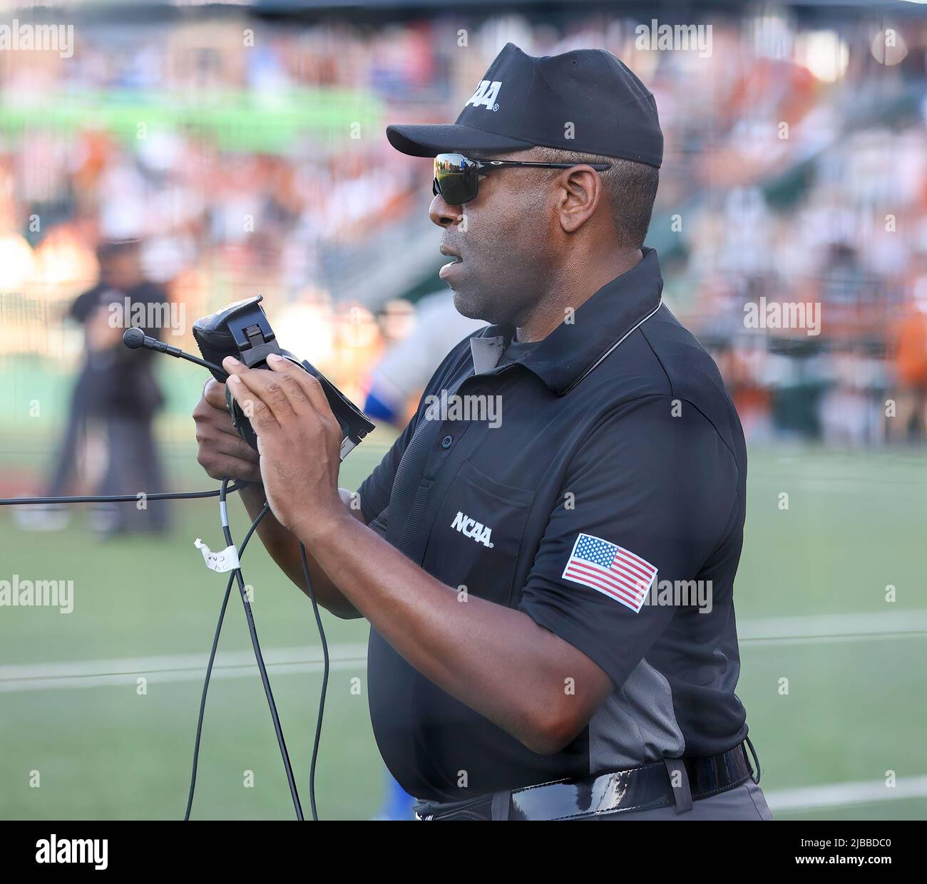 June 4, 2022: Third base umpire Cedric Coleman prepares for a video ...
