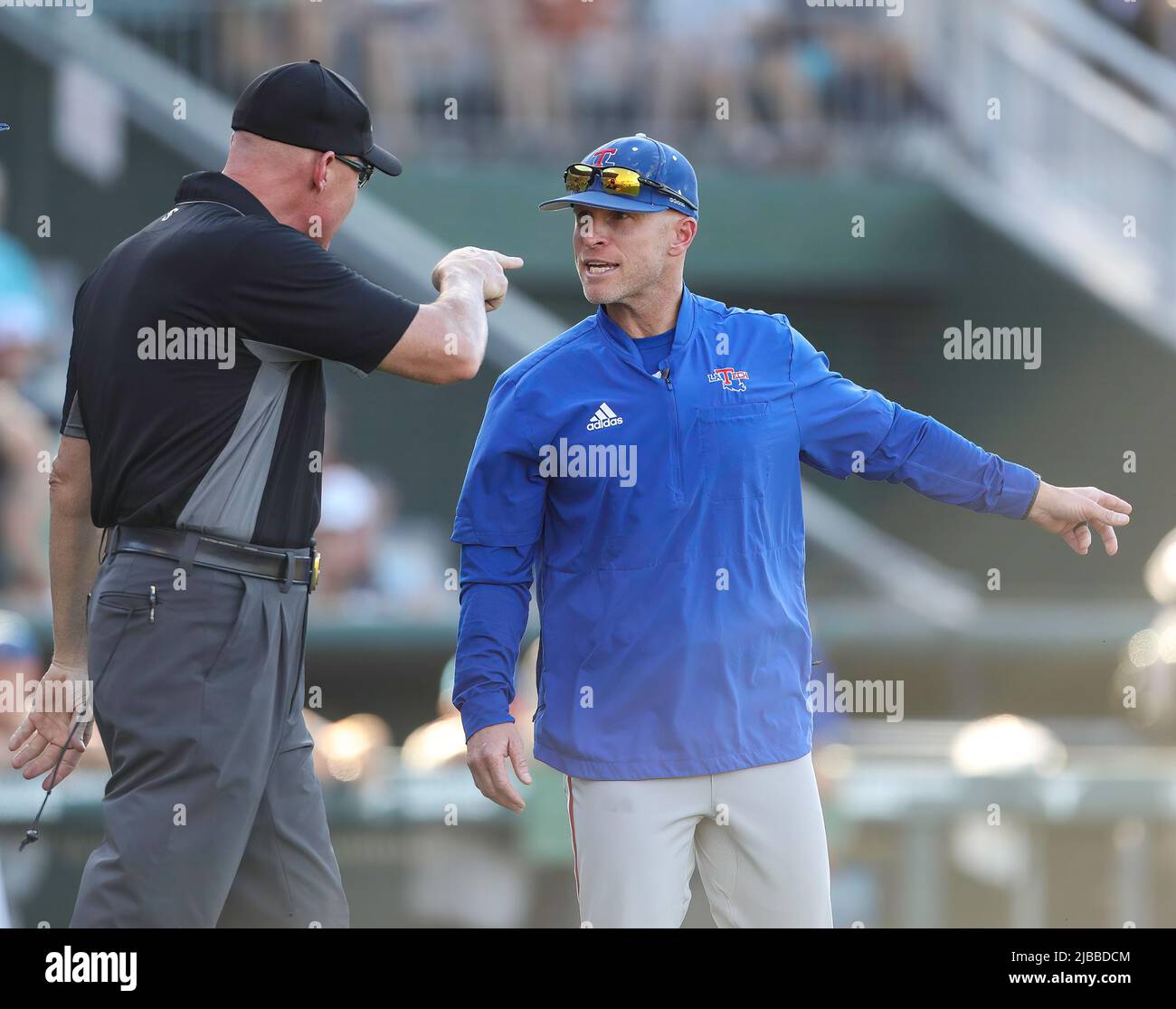 June 4, 2022: Second base umpire Billy Van Raaphorst directs Louisiana ...