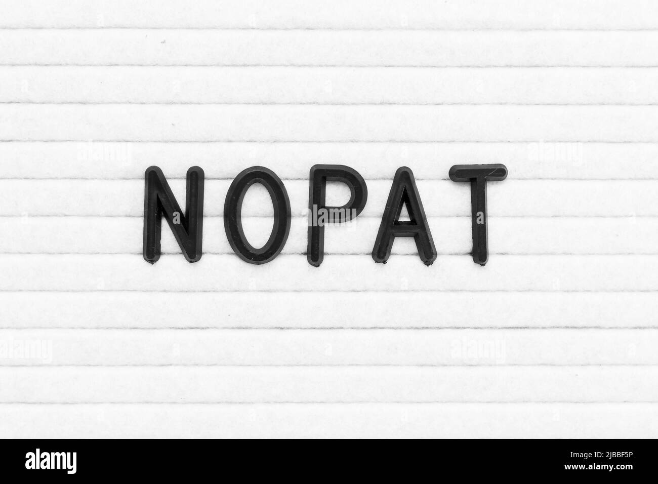 Black color letter in word NOPAT (Abbreviation of net operating profit ...