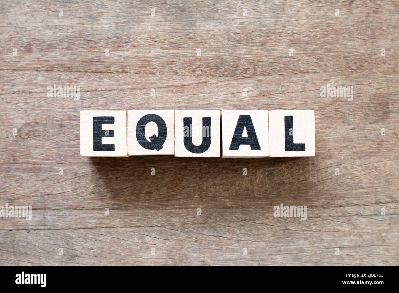 Alphabet letter block in word equal on wood background Stock Photo - Alamy