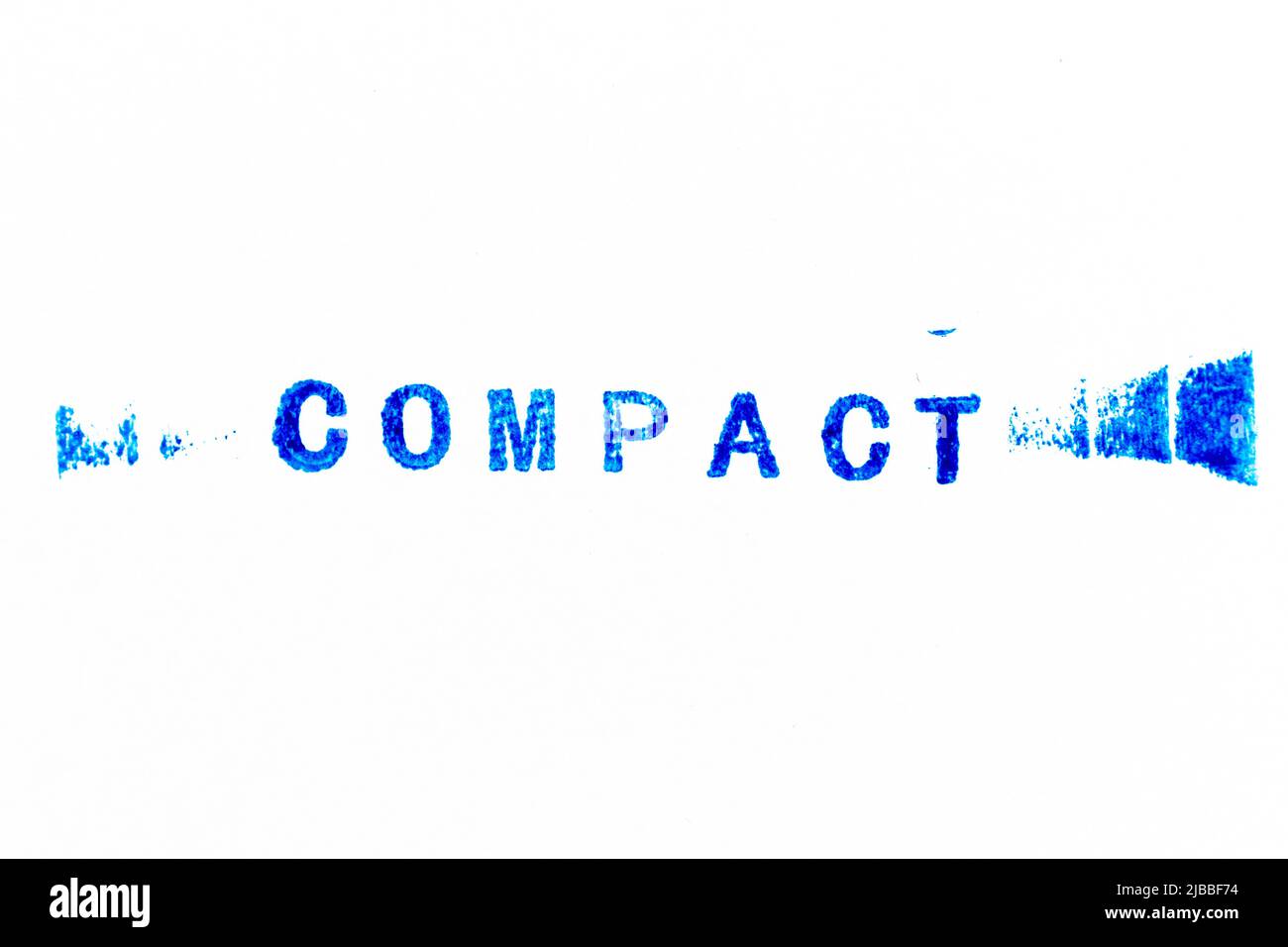 Blue color ink of rubber stamp in word compact on white paper ...