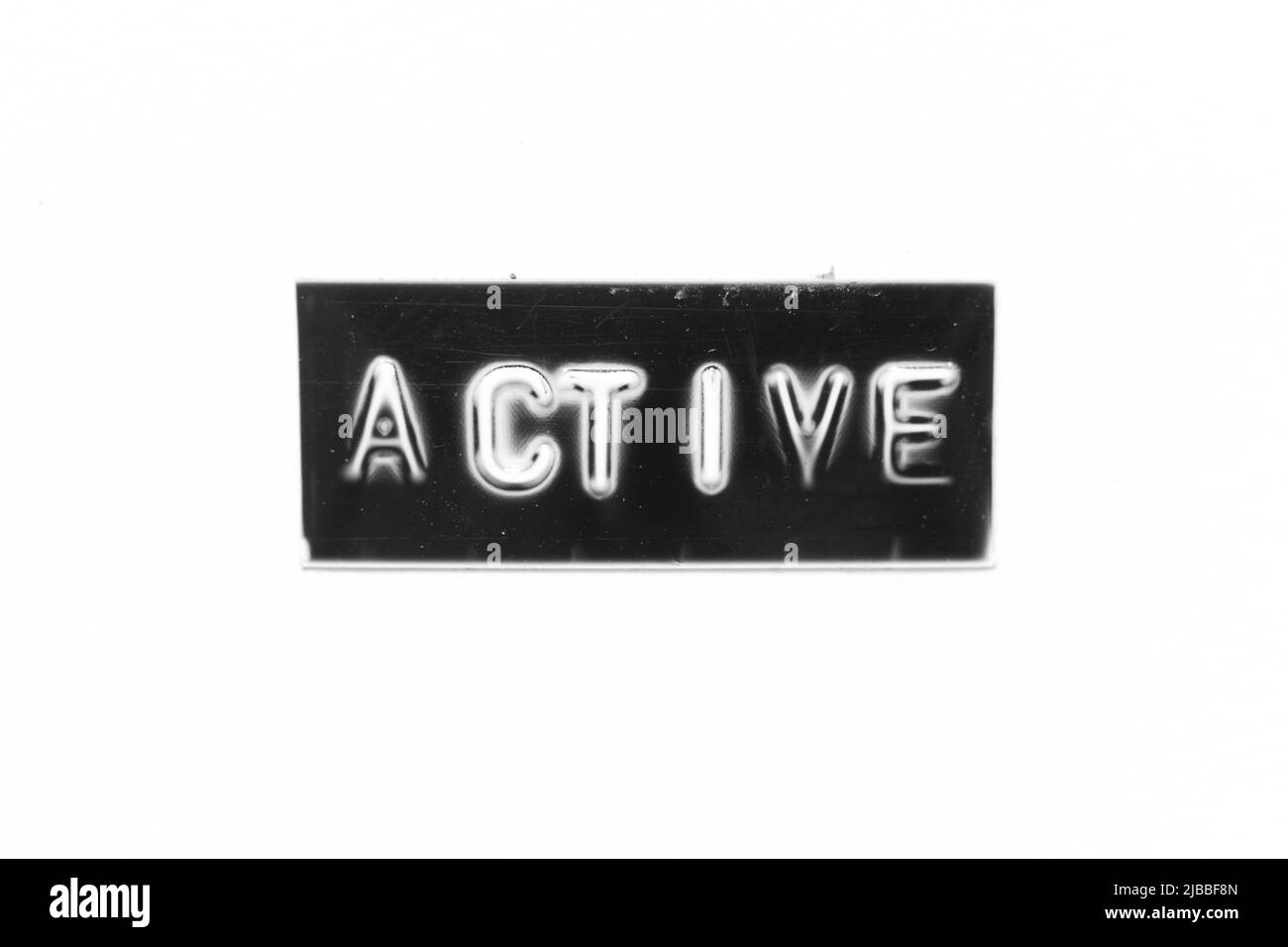 Black color banner that have embossed letter with word active on white ...