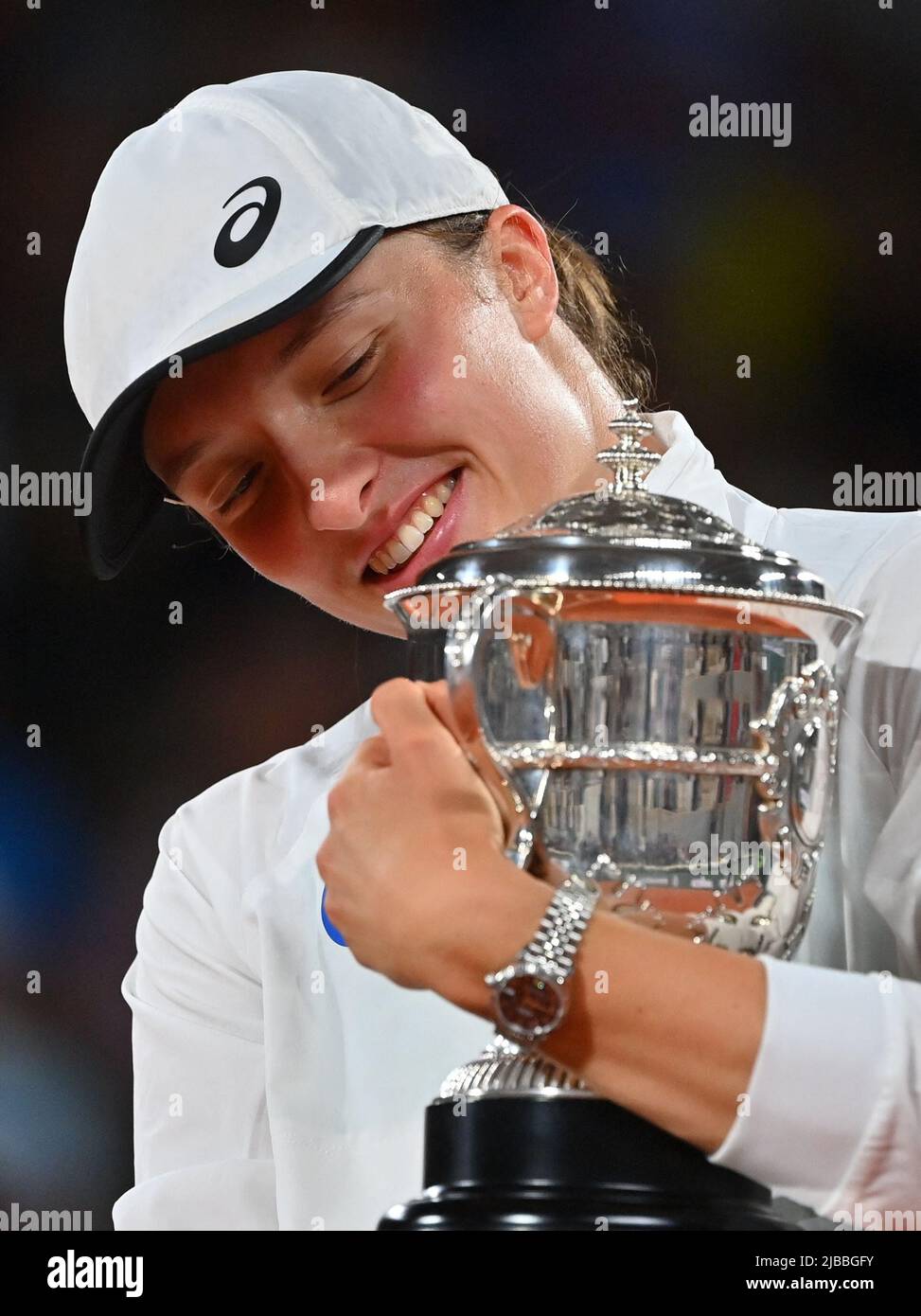Iga Swiatek of Poland celebrates her victory with the trophy during the ...