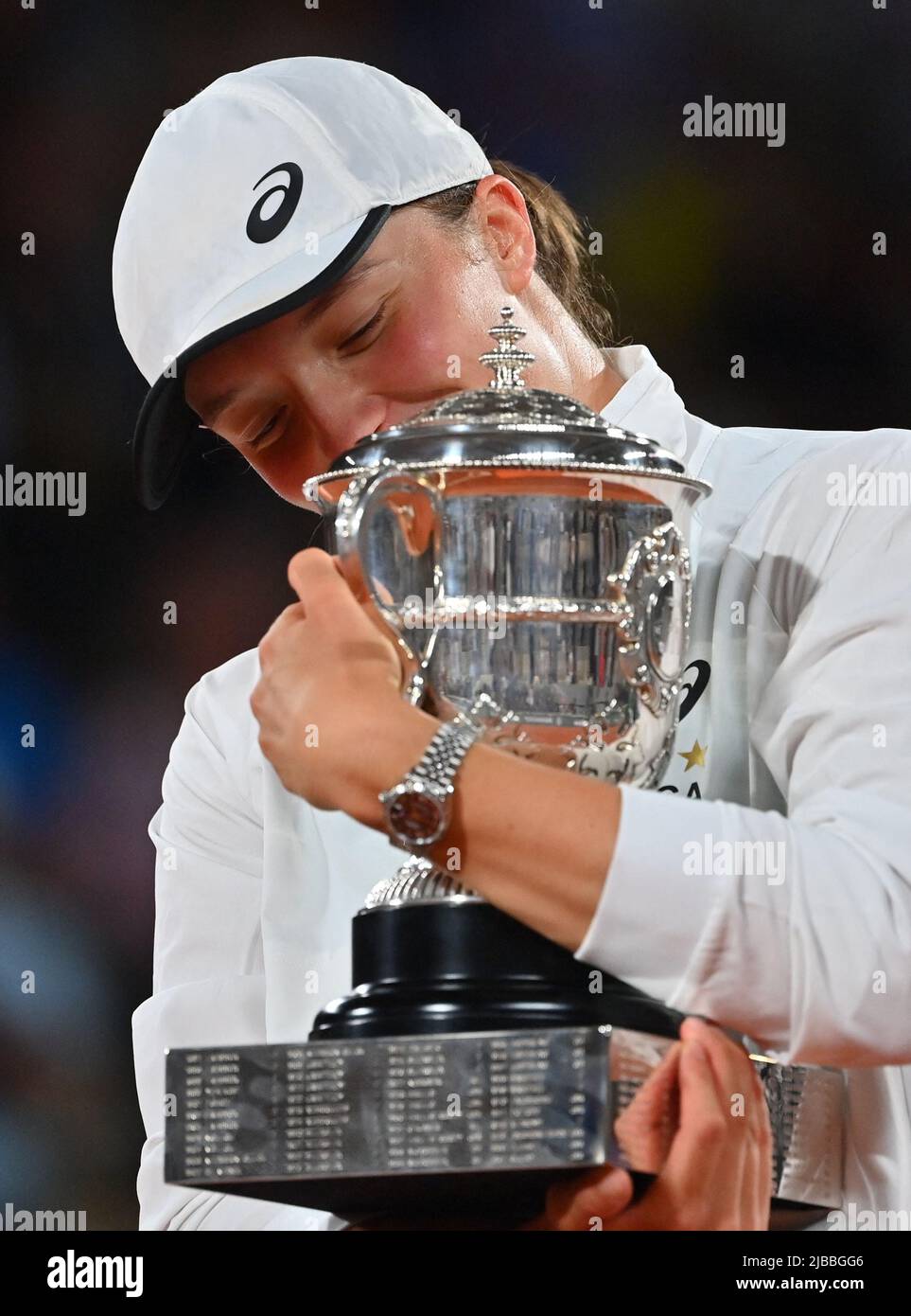 Iga Swiatek of Poland celebrates her victory with the trophy during the ...